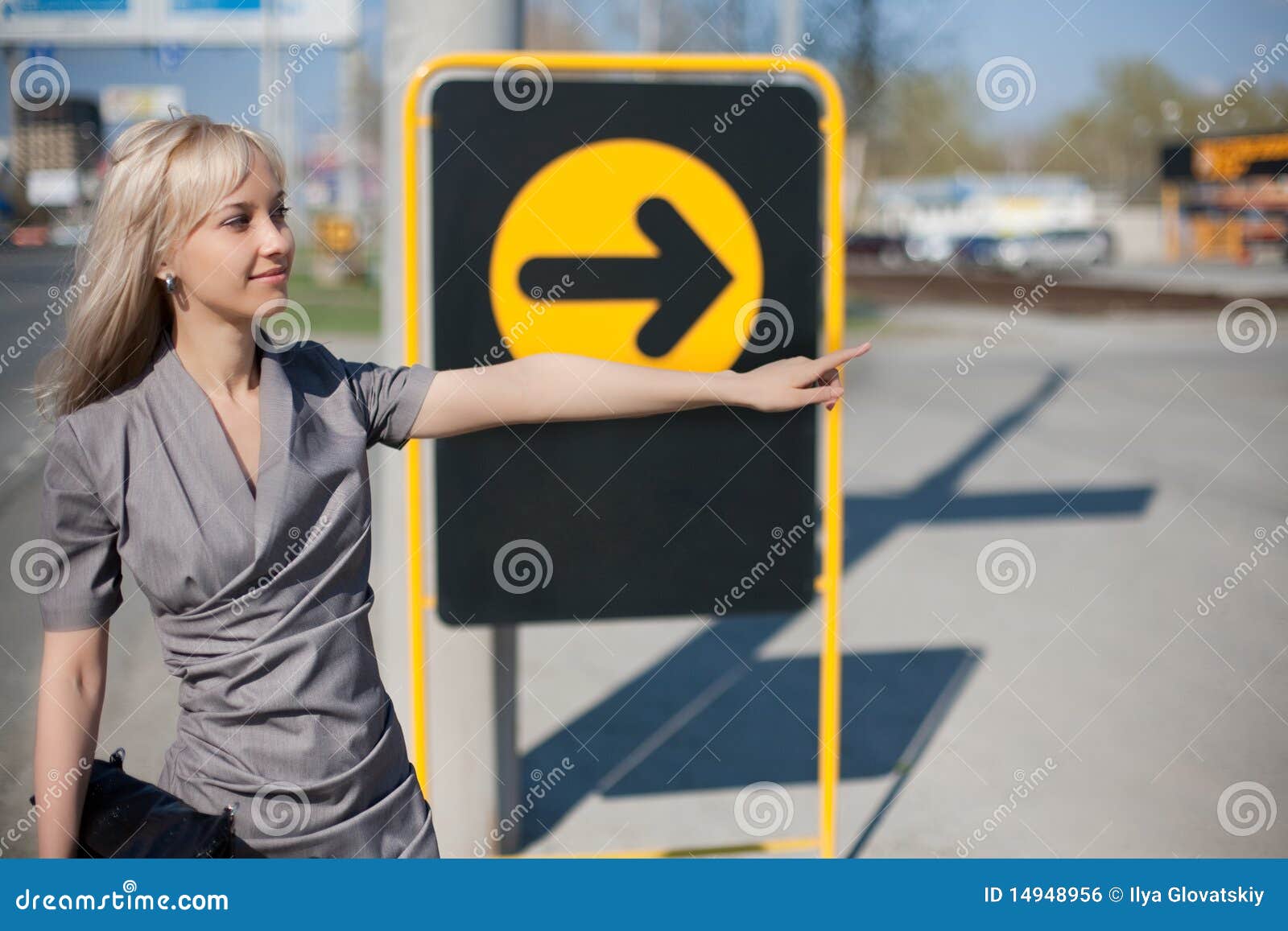 Businesswoman Showing a Direction of Move Stock Photo - Image of face ...