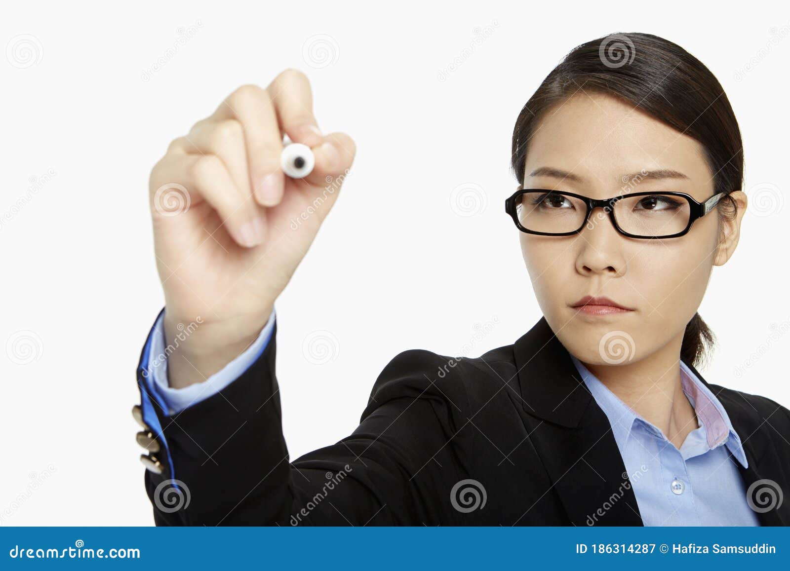 Businesswoman Showing Writing Gesture Stock Image - Image of holding ...