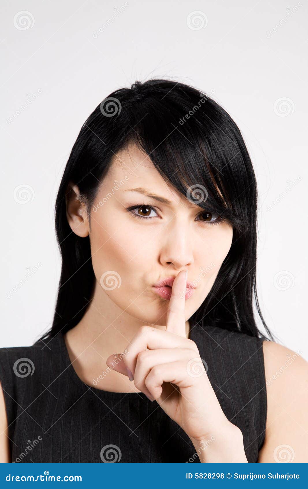 Businesswoman shushing stock photo. Image of fashion, face - 5828298