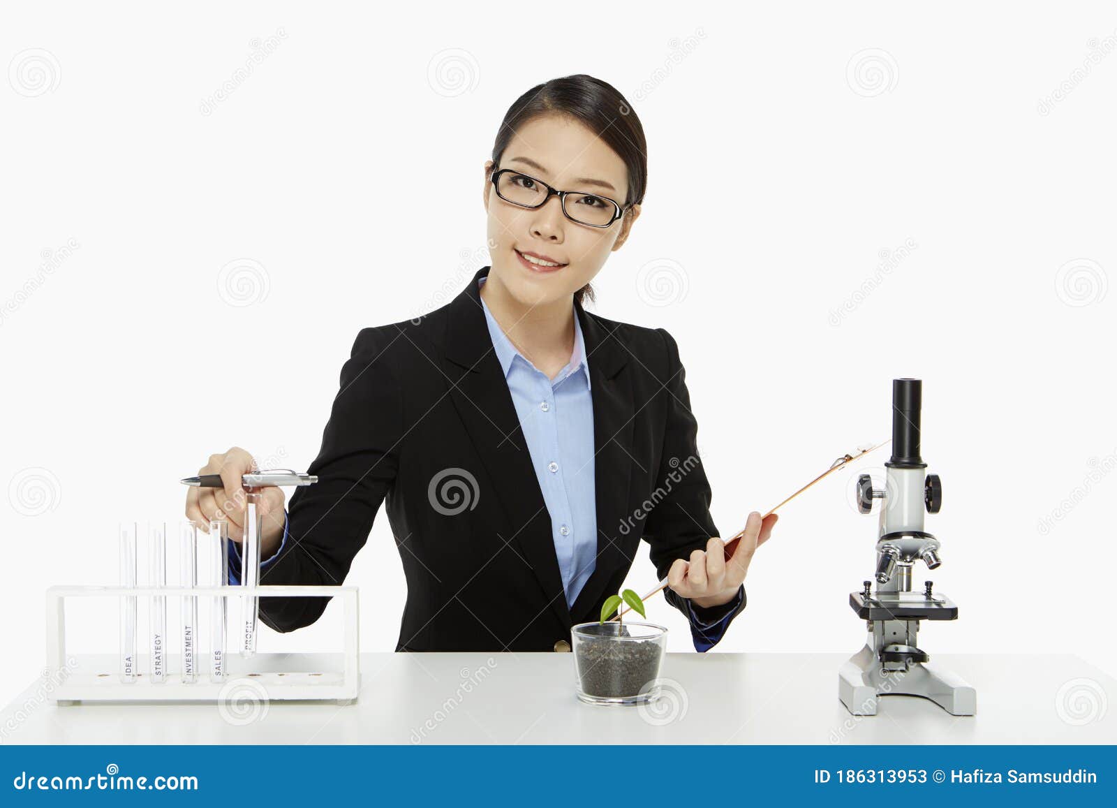 Businesswoman Sitting and Checking the Text Tubes Stock Image - Image ...