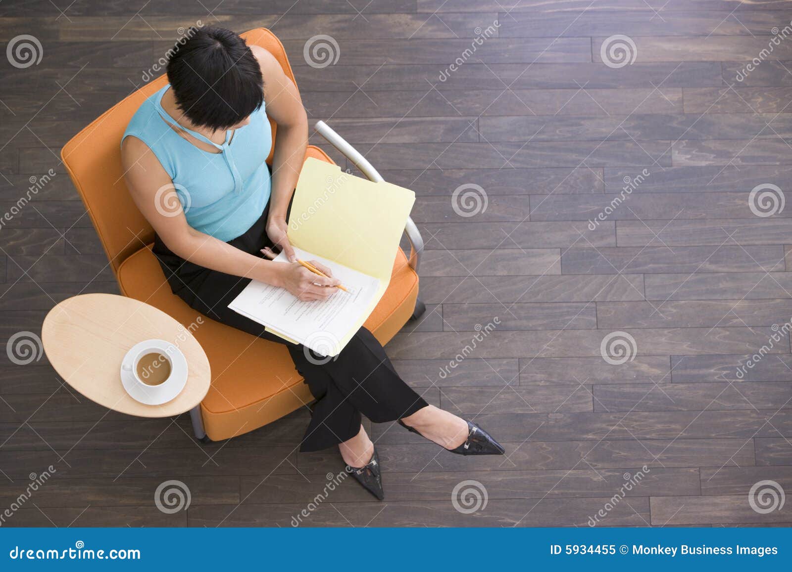 Businesswoman Sitting Indoors Stock Image - Image of camera, looking ...