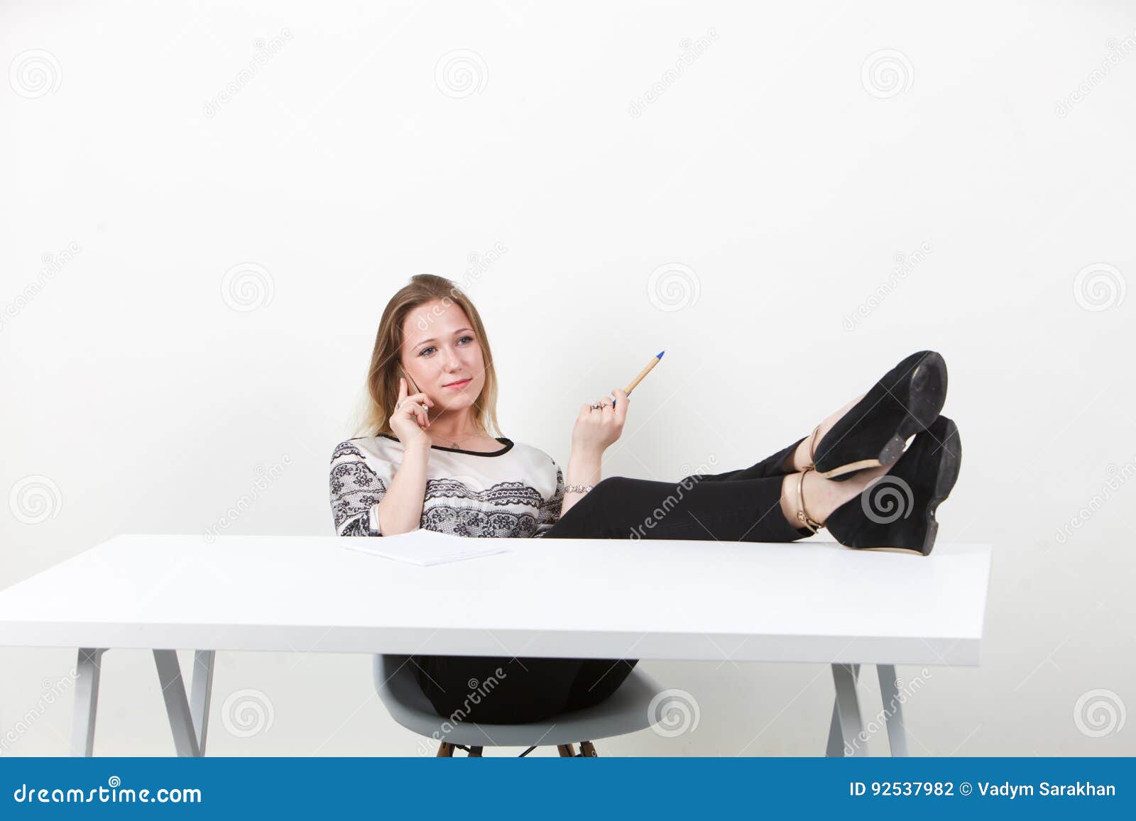 Businesswoman Sitting at Office Feet on Table Stock Photo - Image of ...