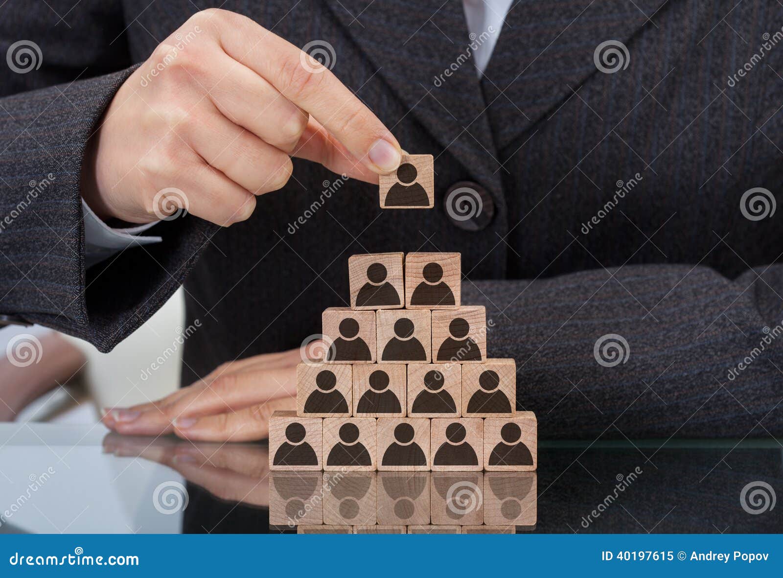 Businesswoman Stacking Wooden Team Blocks Stock Image - Image of ...
