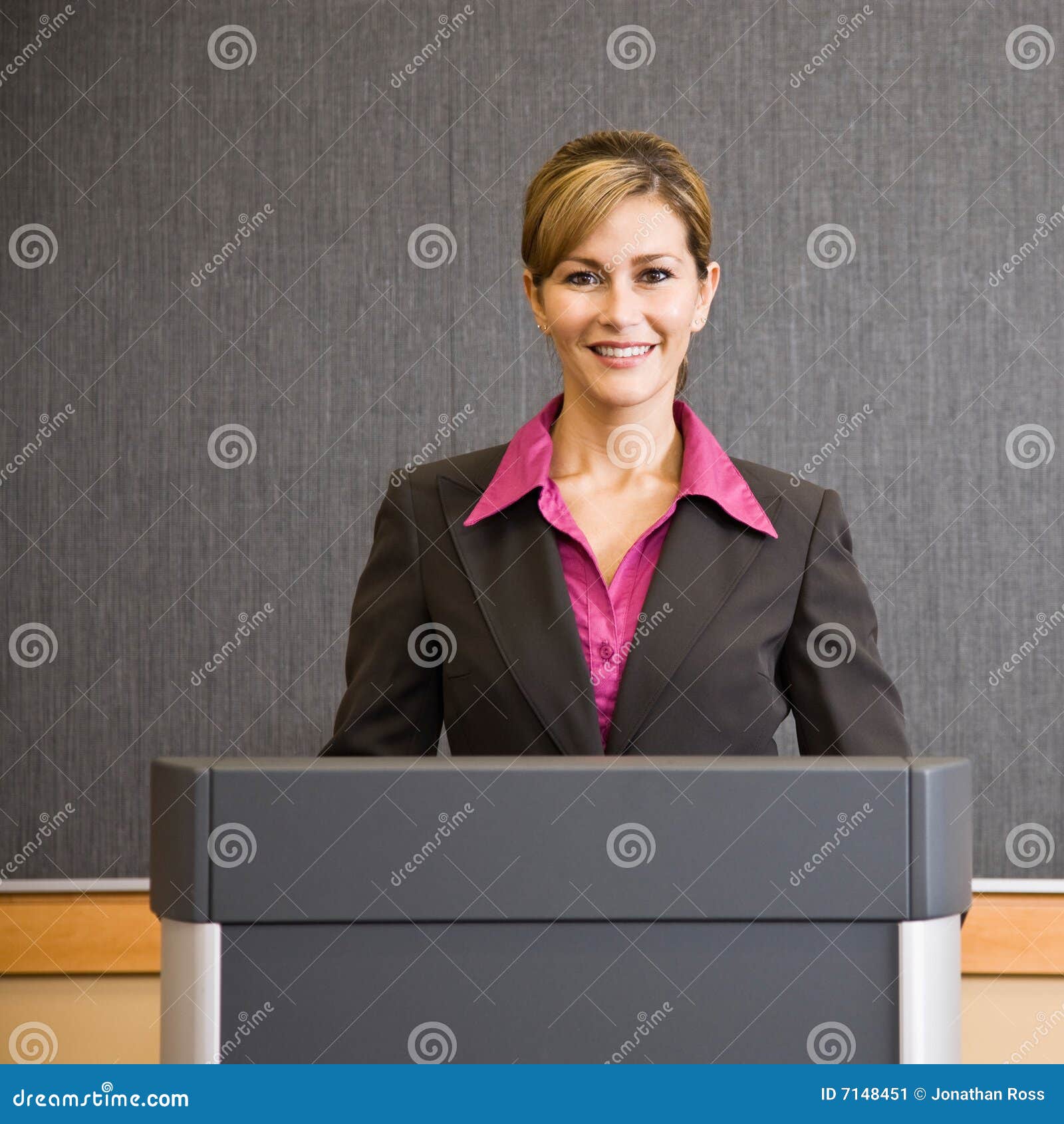 Businesswoman Standing Behind Podium Stock Image - Image of business ...