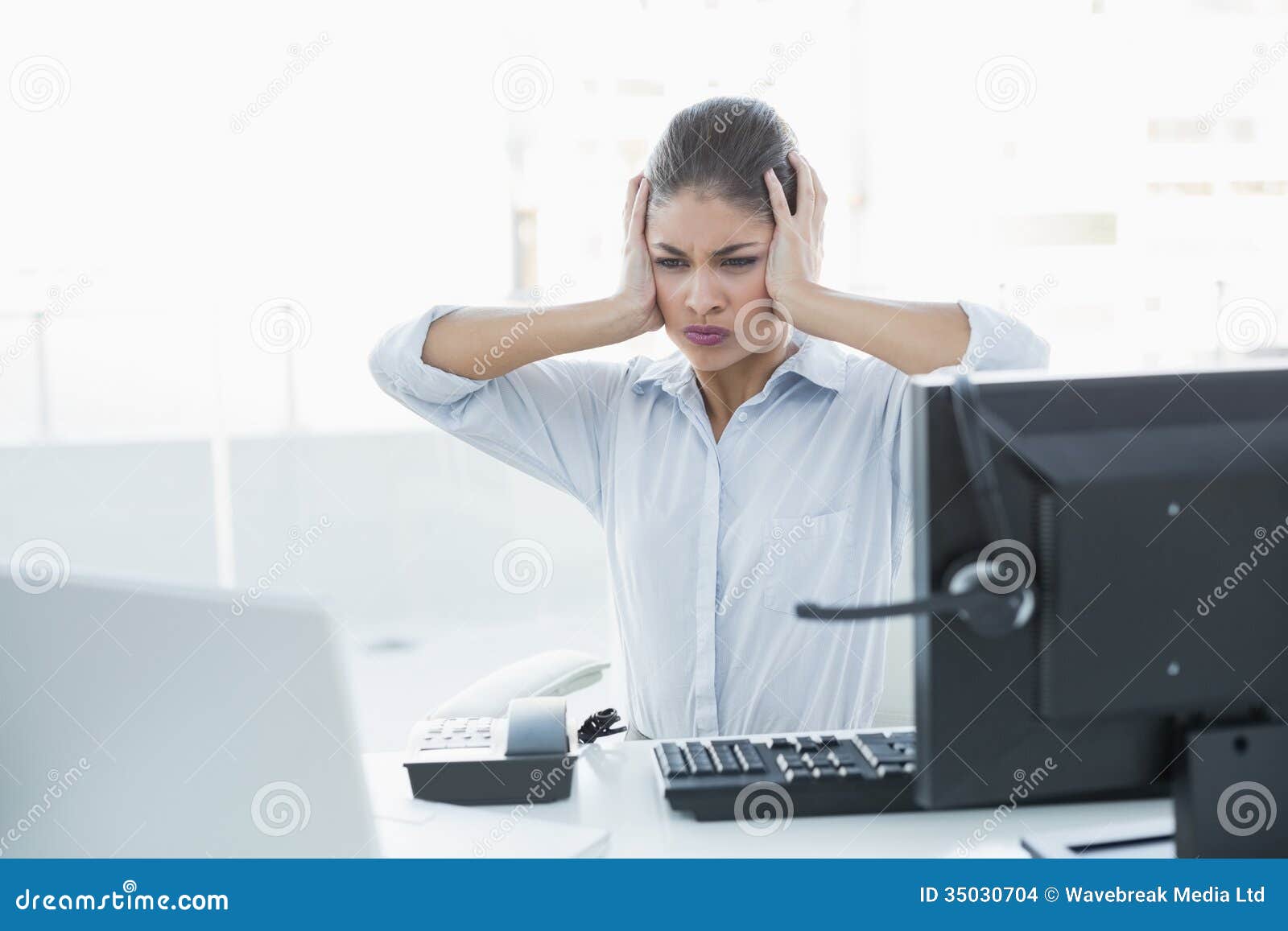 Businesswoman Suffering from Headache in Front of Computer Stock Photo ...