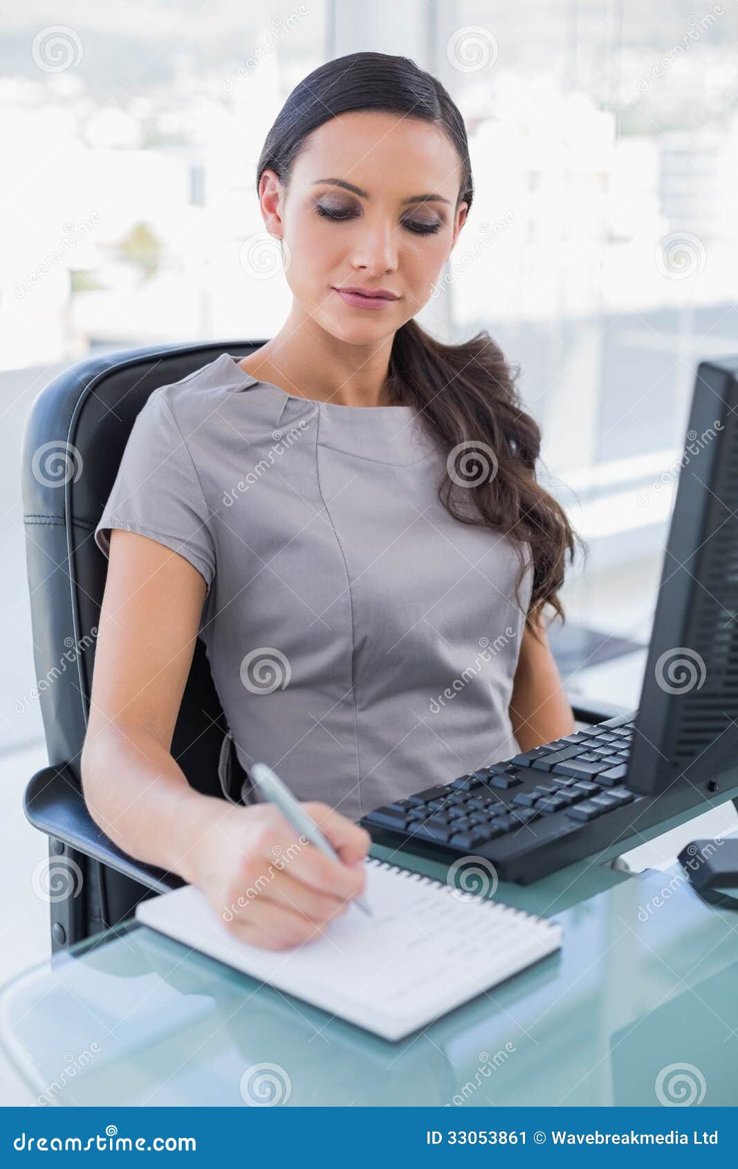 Businesswoman taking notes stock image. Image of cheerful - 33053861