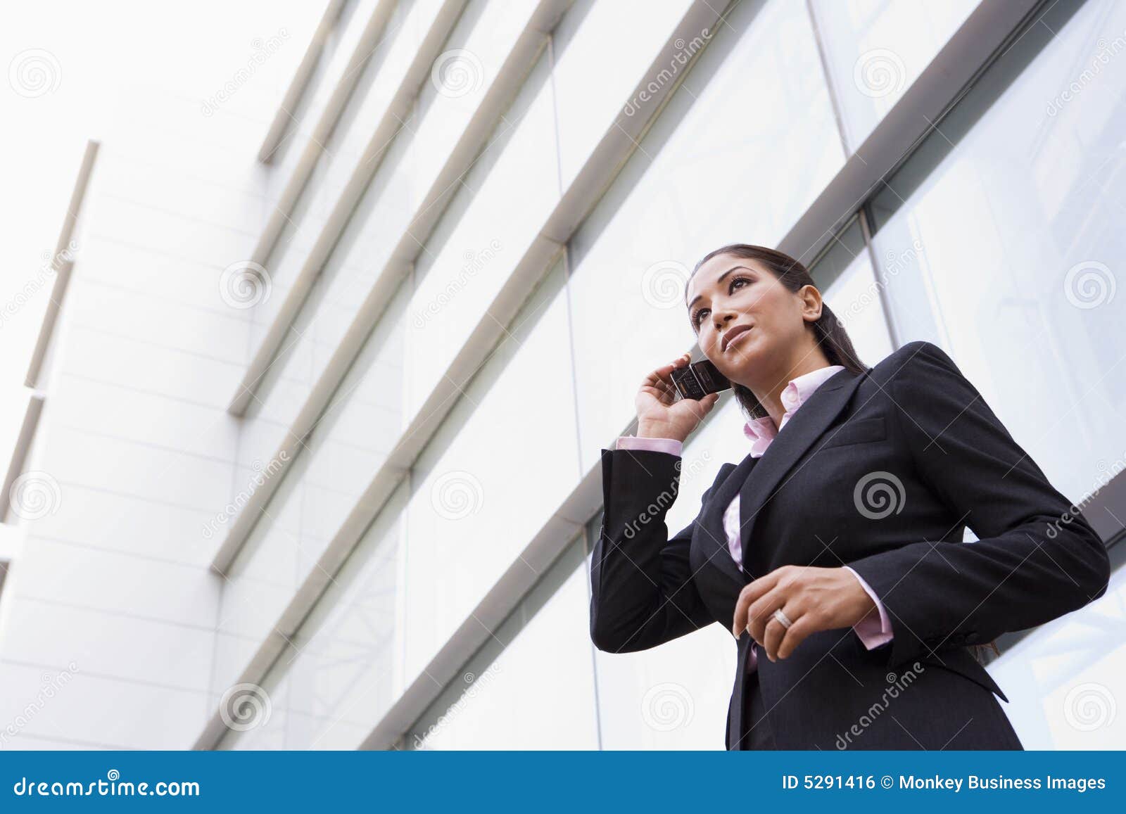 Businesswoman Talking on Cell Phone Outside Stock Photo - Image of cell ...
