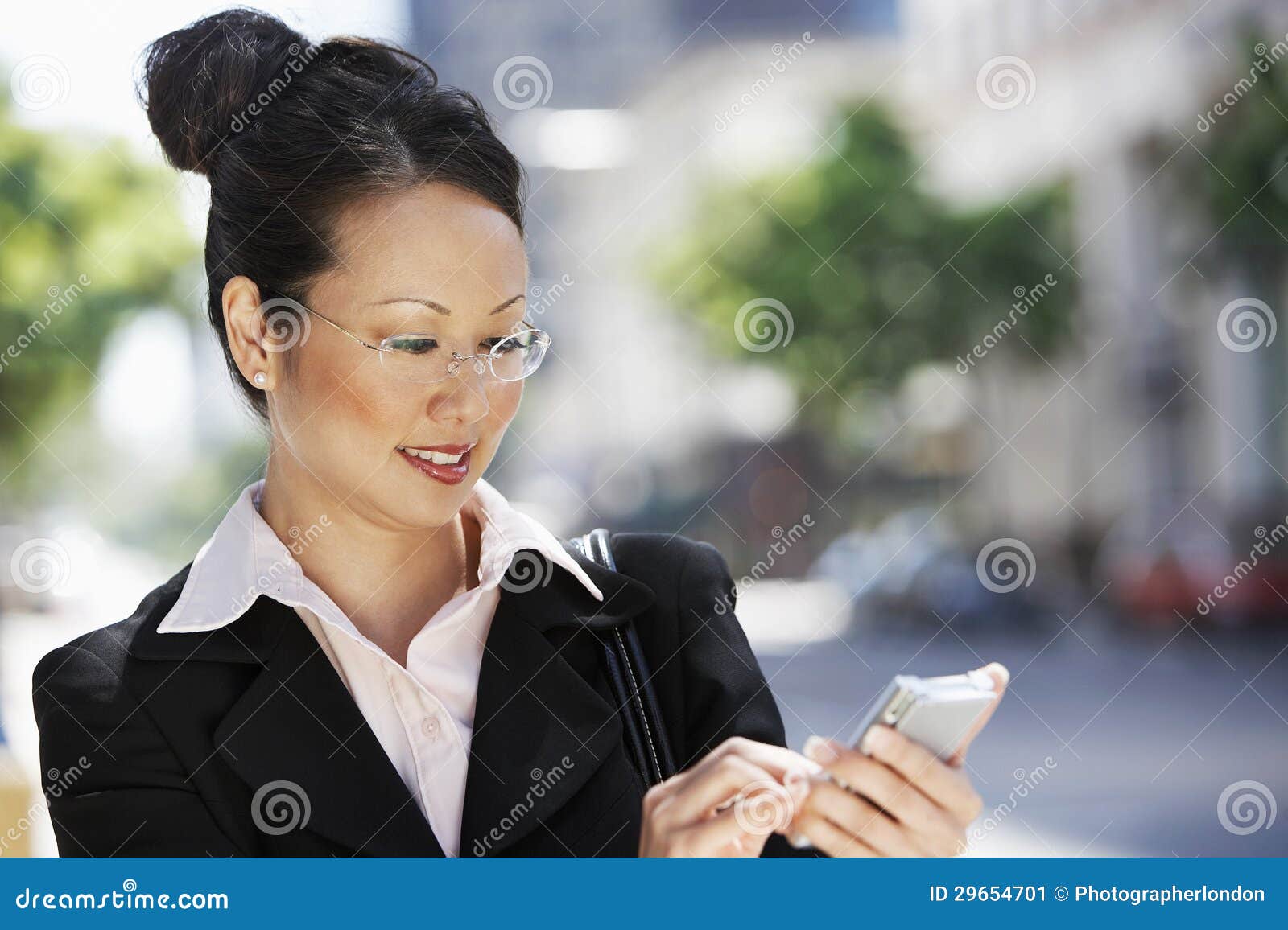 Businesswoman Using Cell Phone Stock Image - Image of glasses, people ...