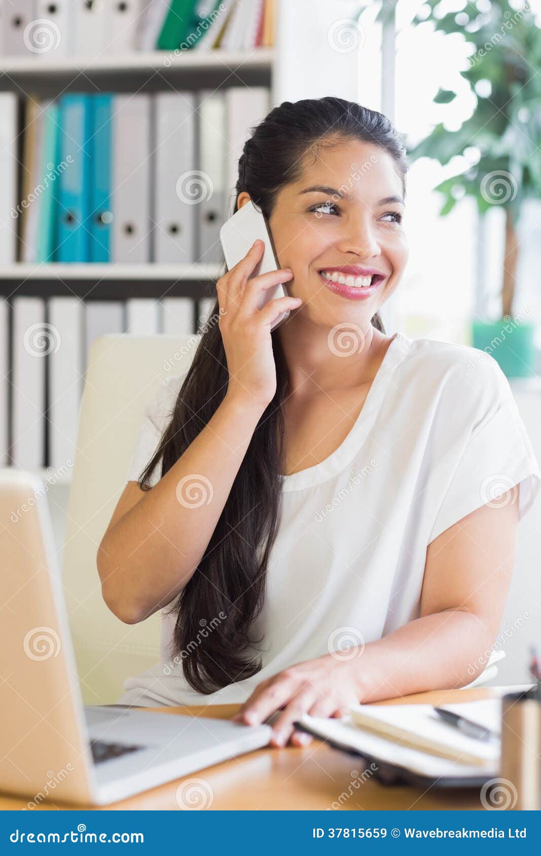 Businesswoman Using Cell Phone at Desk Stock Image - Image of business ...