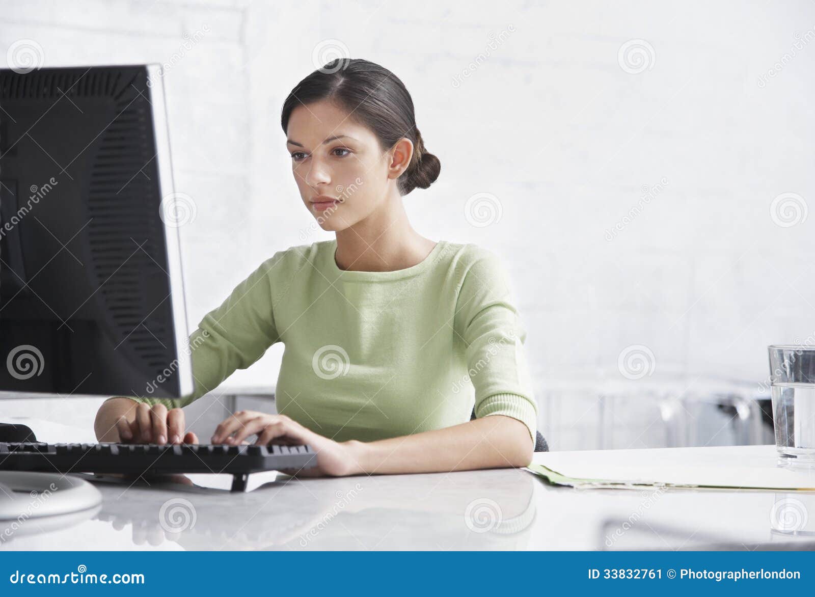 Businesswoman Using Computer at Desk Stock Image - Image of copyspace ...