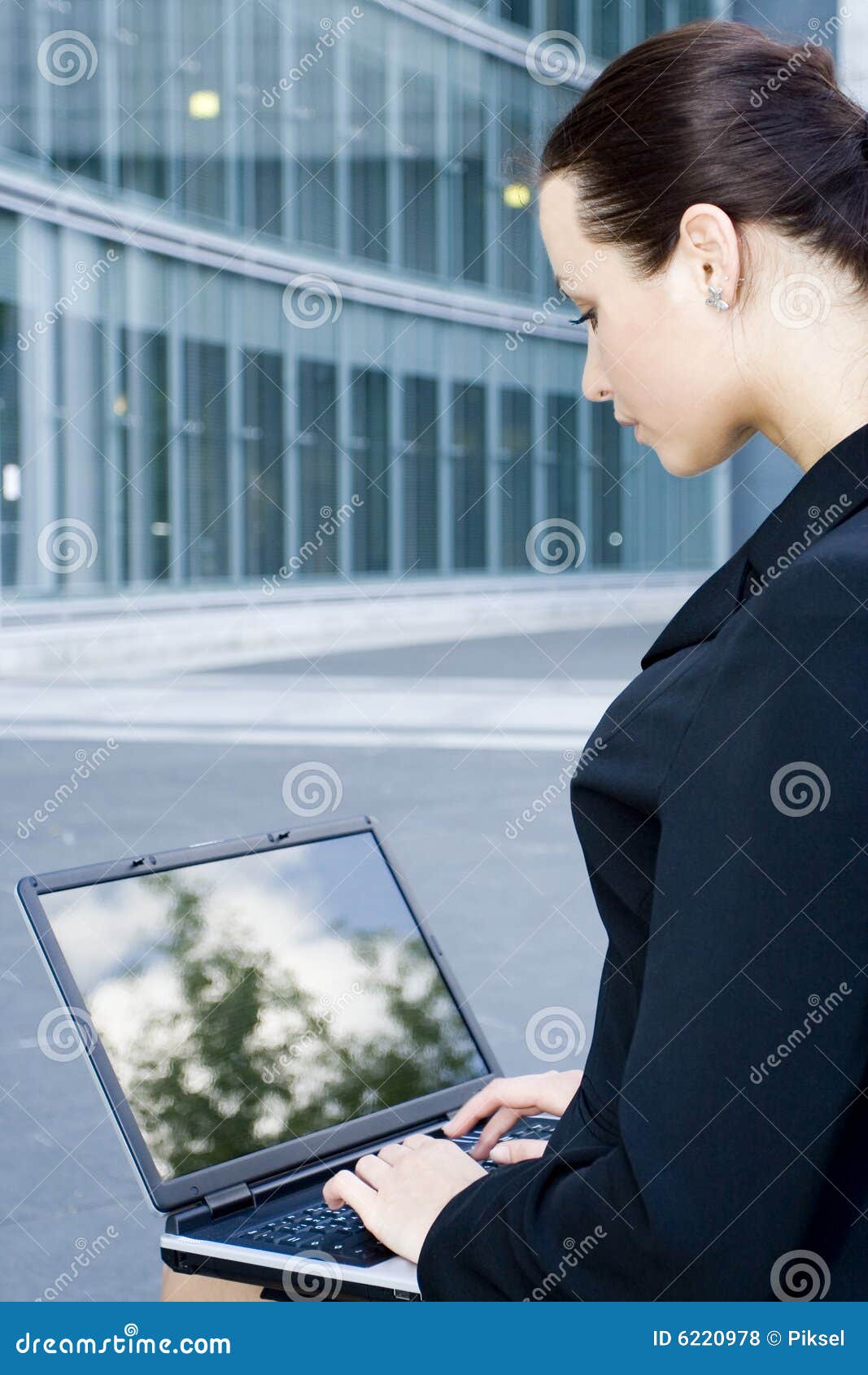Businesswoman using laptop stock photo. Image of city - 6220978