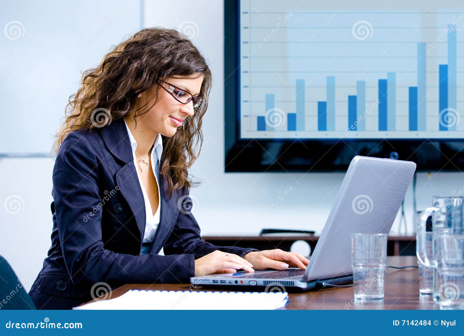 Businesswoman using laptop stock photo. Image of friendly - 7142484 Businesswoman using laptop stock photo. Image of friendly - 7142484