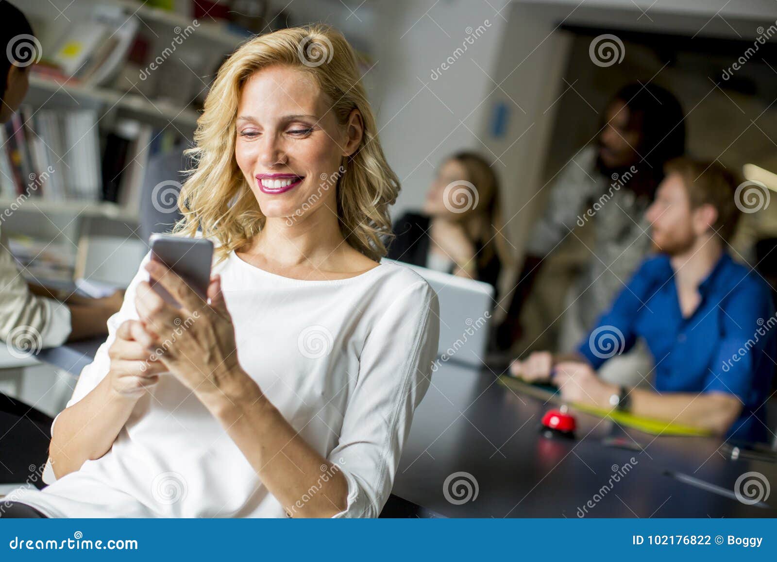 Businesswoman Using Mobile Phone in Office Stock Photo - Image of ... Businesswoman Using Mobile Phone in Office Stock Photo - Image of ...