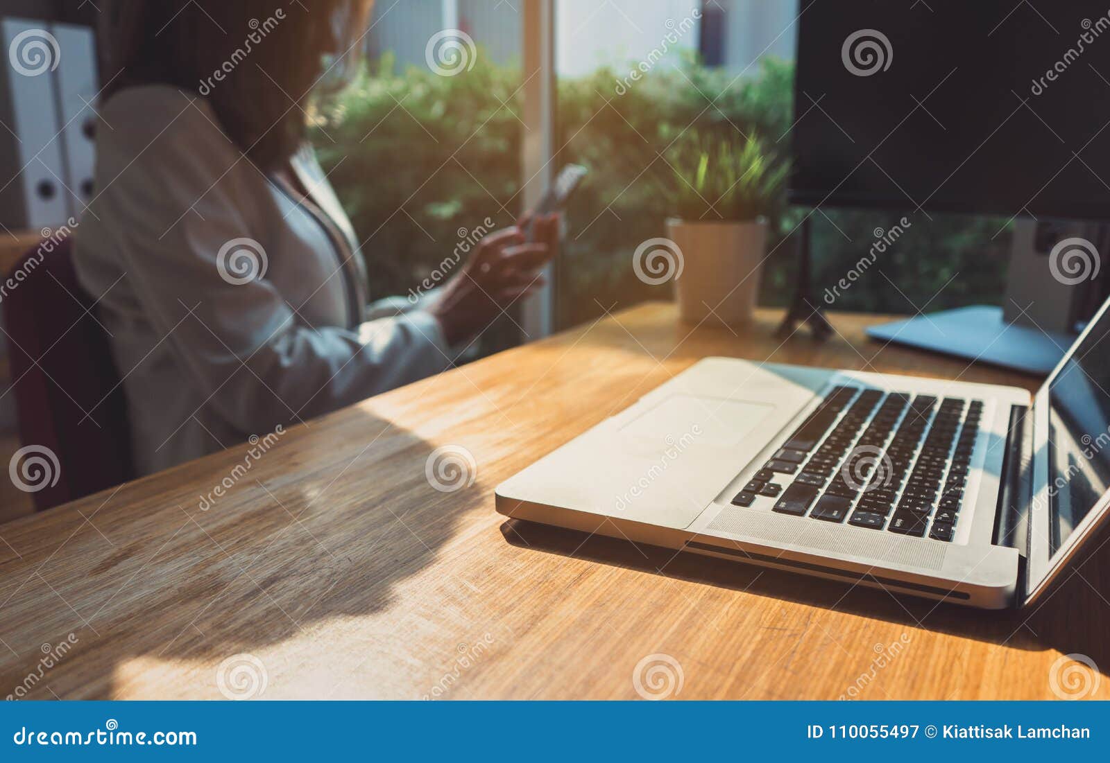Businesswoman Using Smartphone and Laptop Stock Image - Image of ...