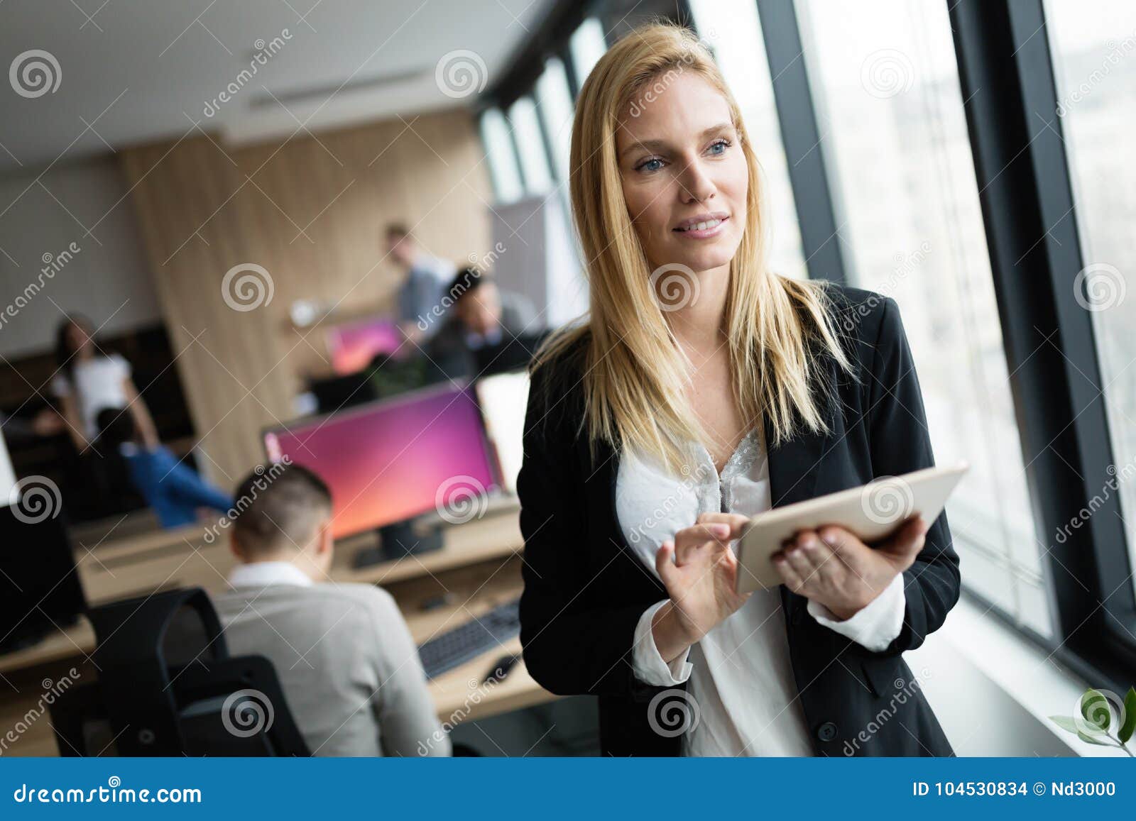 Businesswoman Using Tablet at Information Technology Office Stock Photo ...