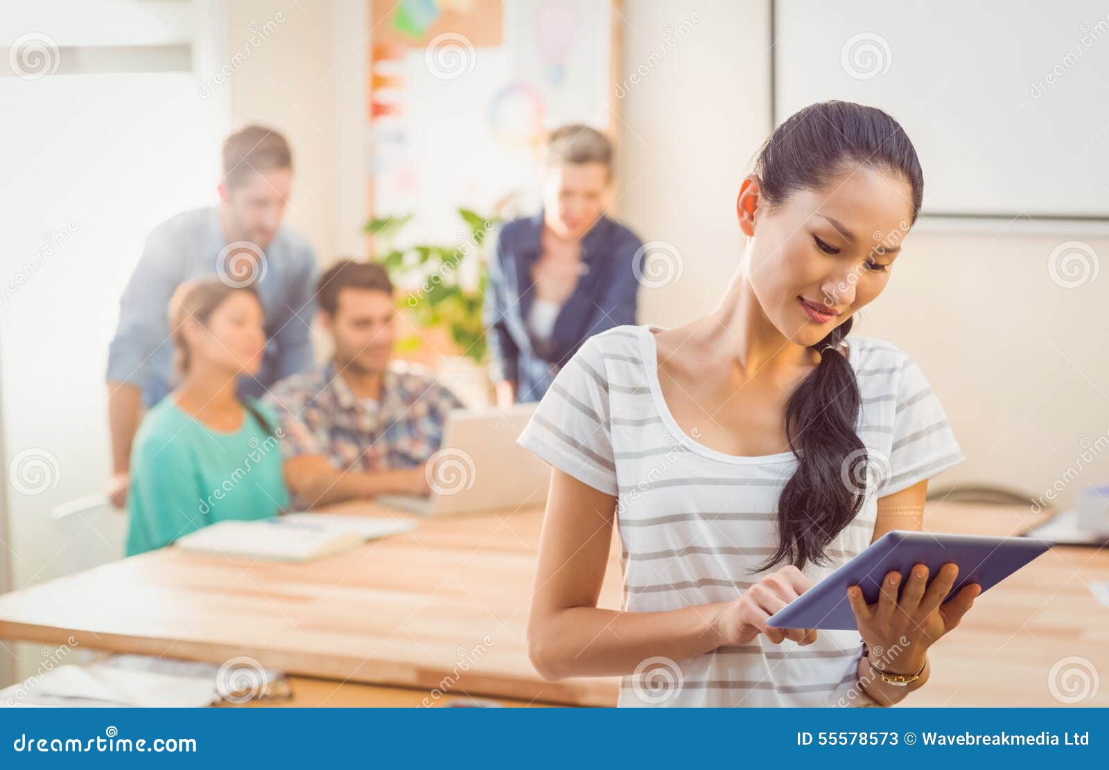 Businesswoman Using Tablet in the Office Stock Image - Image of design ...