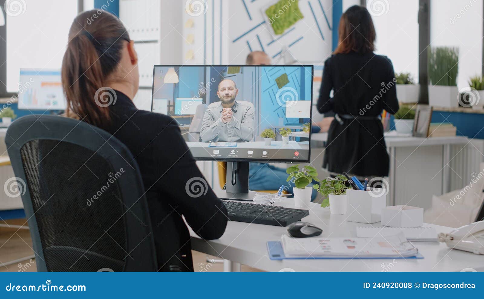 Businesswoman Using Video Call on Computer for Conversation Stock Photo ...