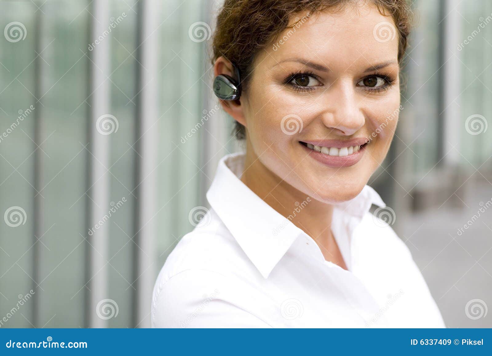 Businesswoman Wearing Bluetooth Stock Image - Image of collar, office ...