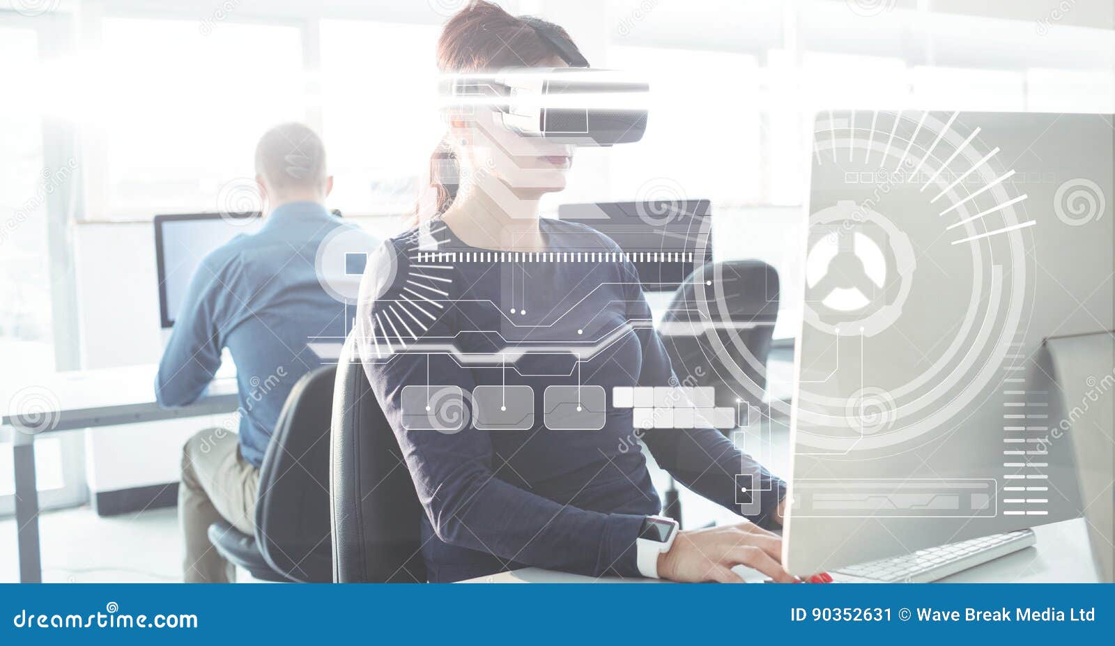 Businesswoman Wearing VR Glasses while Using Computer in Office Stock ...