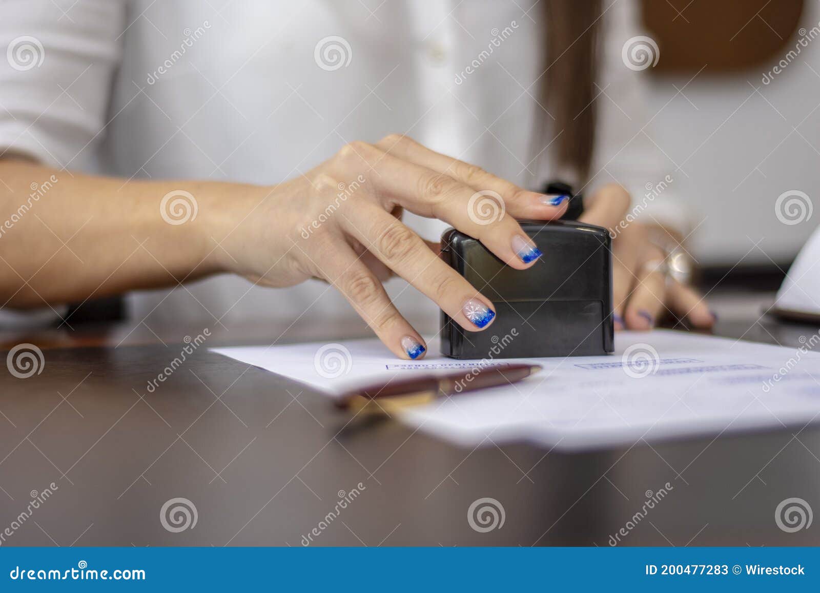 Businesswoman Working on the Documents with a Stamp Stock Image - Image ...