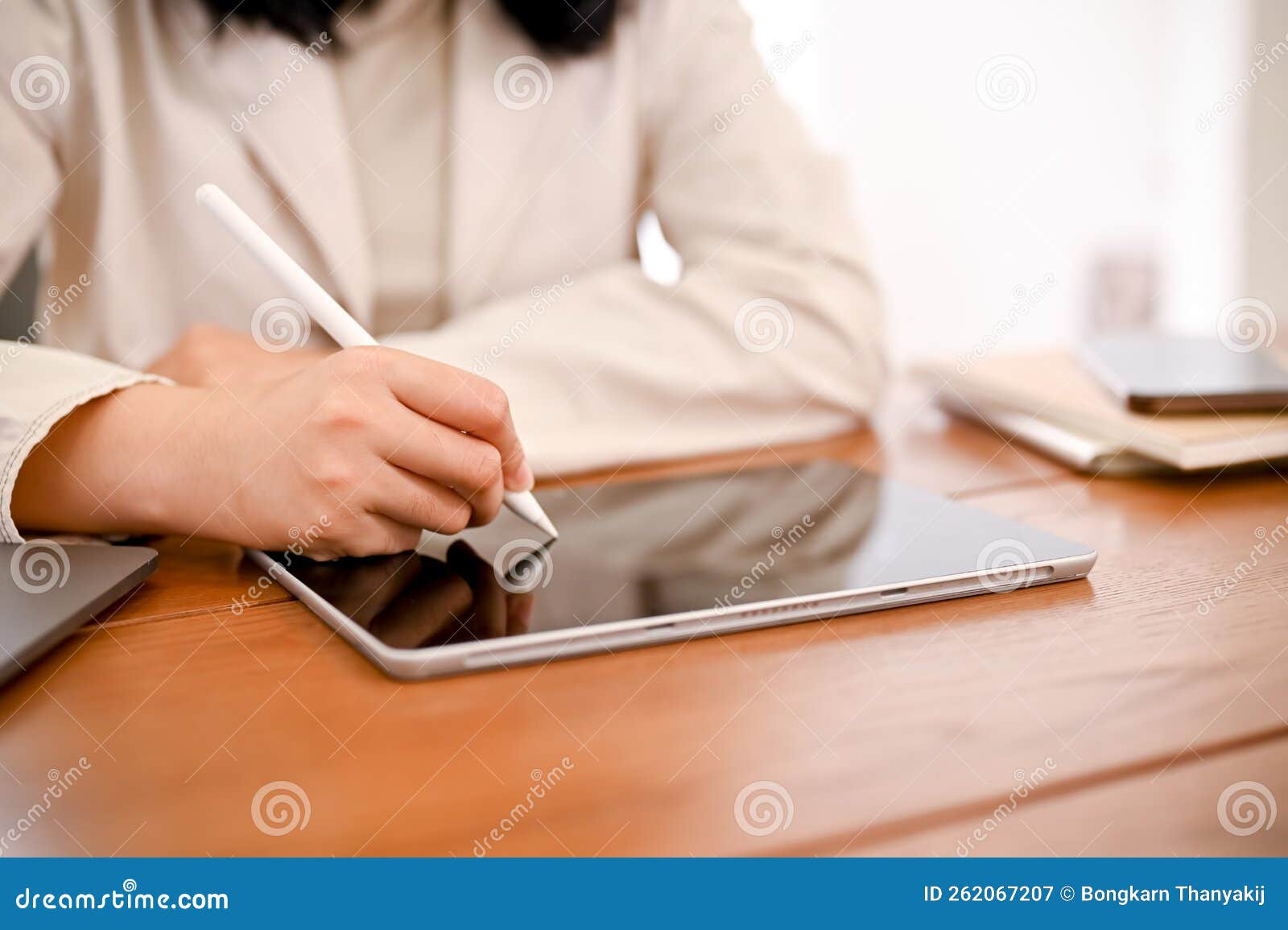 A Businesswoman Working on Her Task, Using Digital Tablet Touchpad To ...