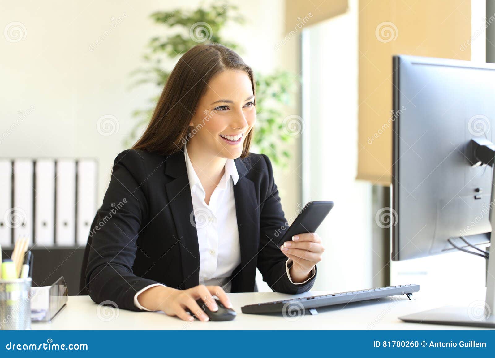 Businesswoman Working with Phone and Computer Stock Photo - Image of ...