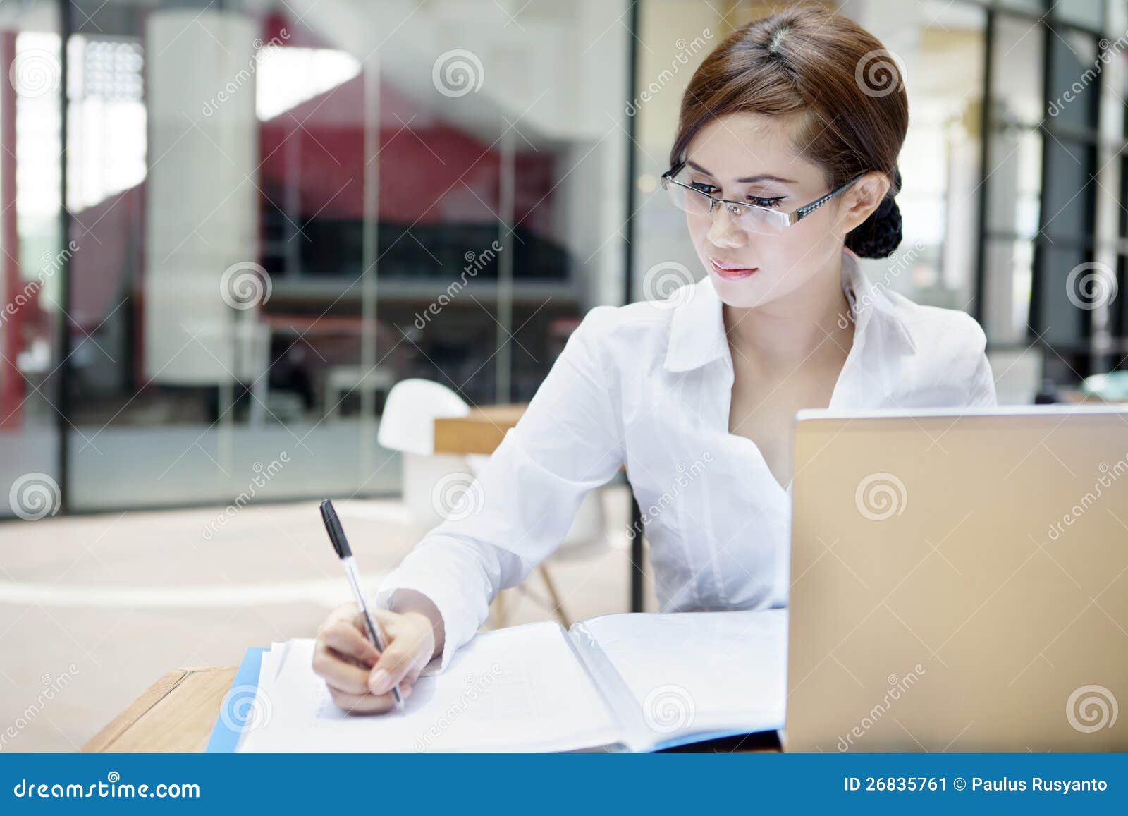 Businesswoman Writes on a Document Stock Image - Image of internet ...