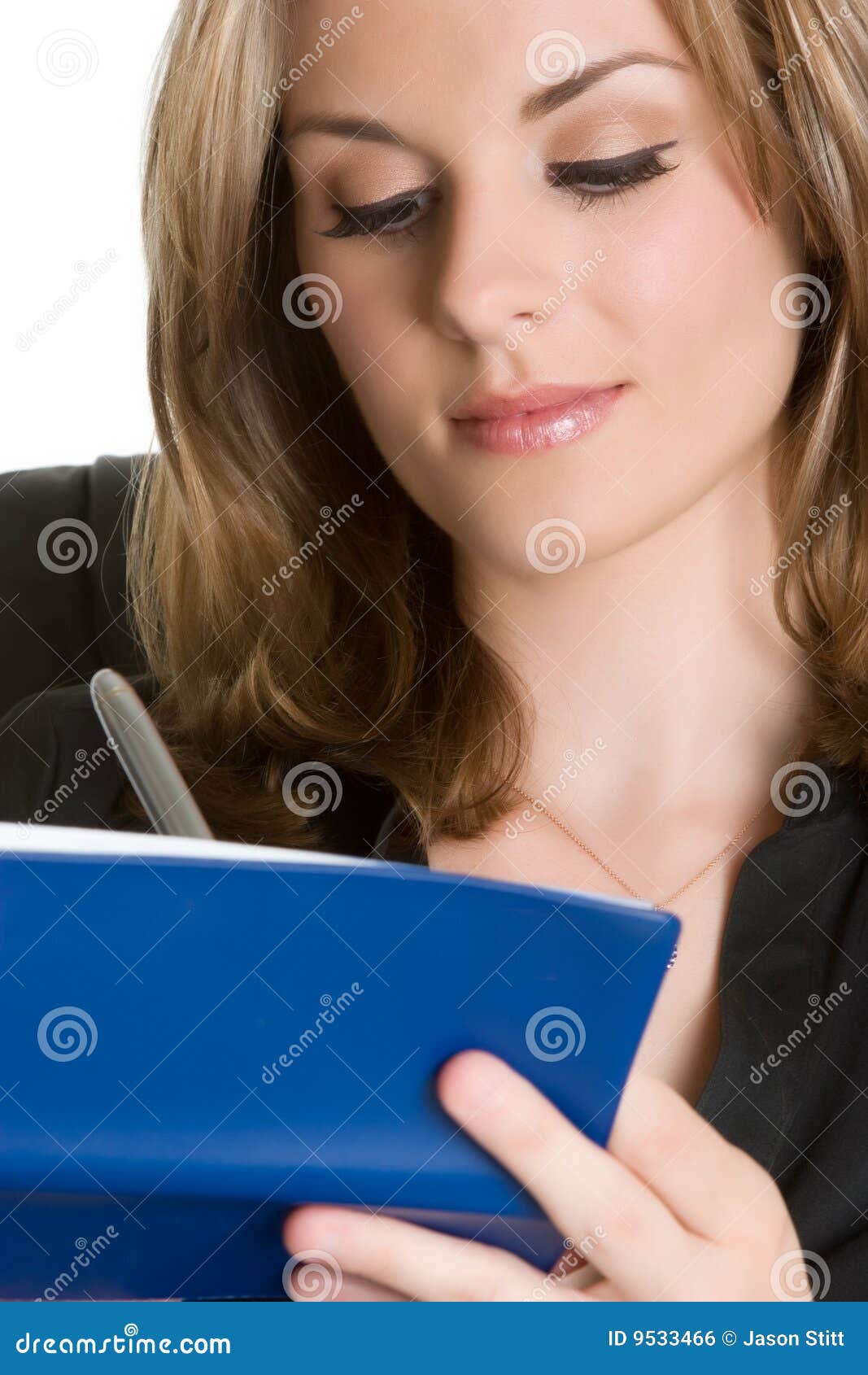 Businesswoman Writing Checks Stock Photo - Image of book, beautiful ...