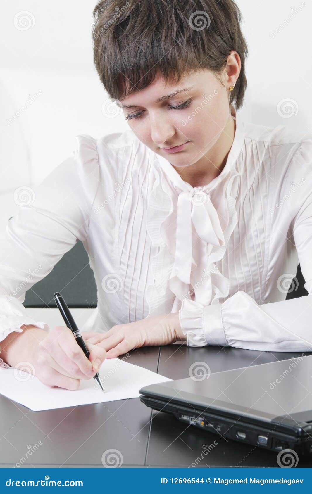 Businesswoman Writing at Desk Stock Photo - Image of writing, pretty ...