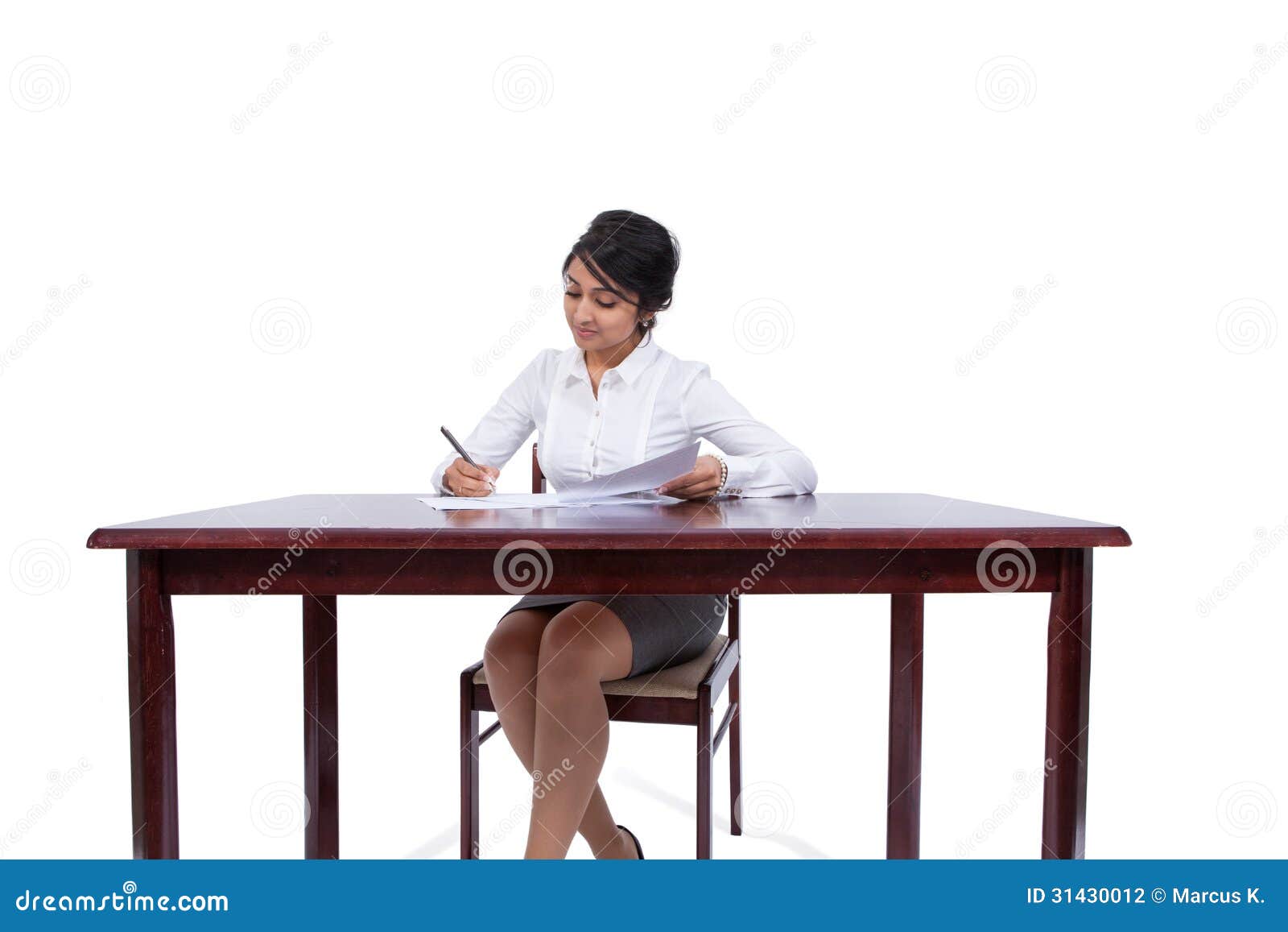 Businesswoman Writing Notes at Her Desk Stock Photo - Image of filling ...