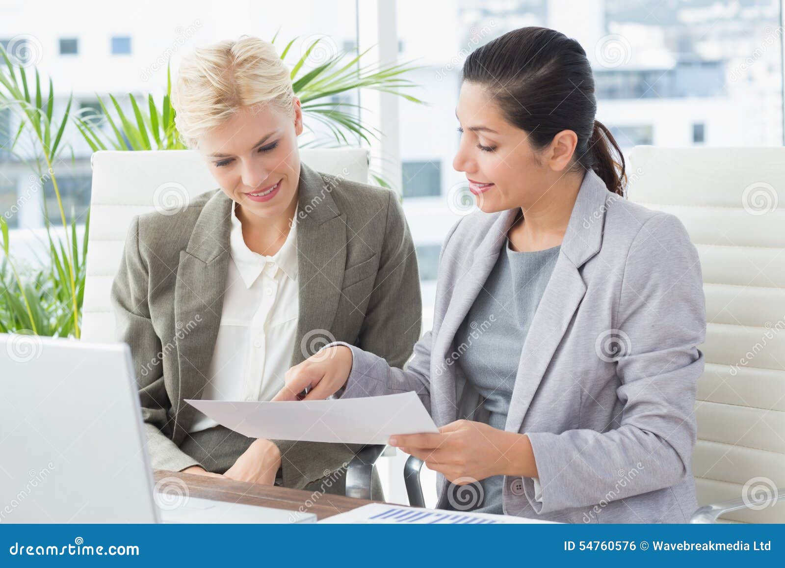 Businesswomen Reading Files Stock Photo - Image of employee, happy ...