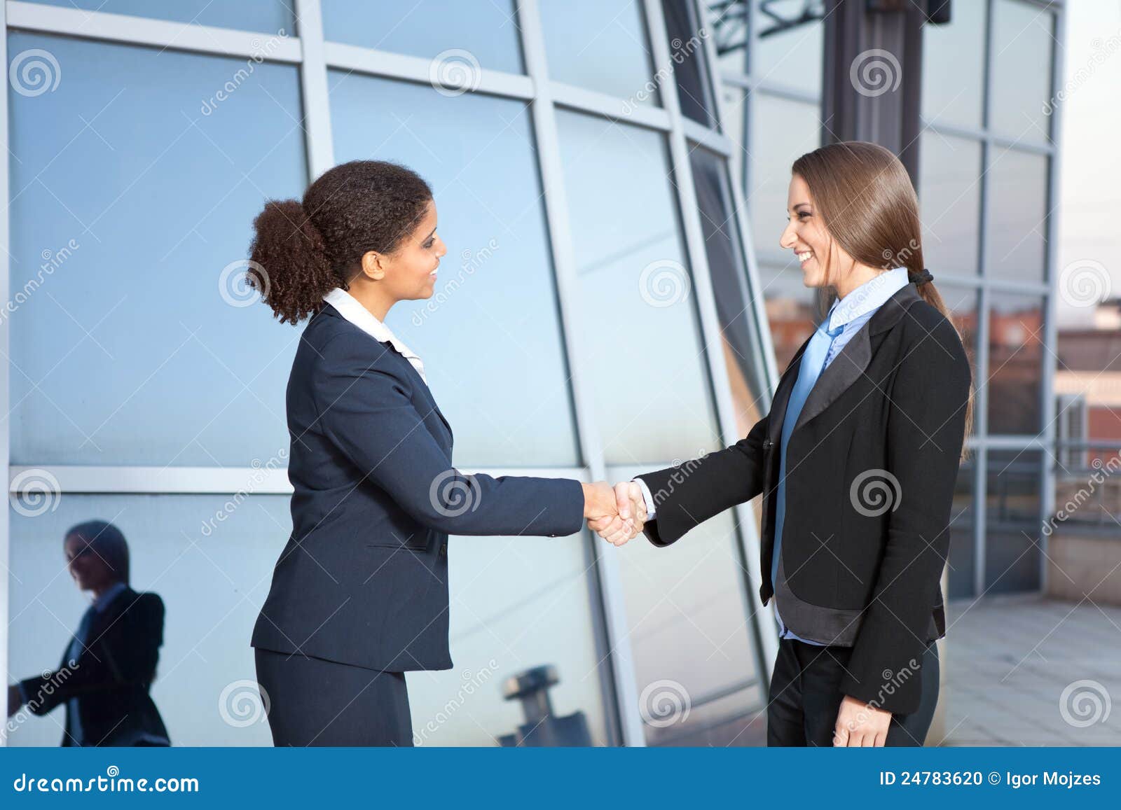 Businesswomen Shaking Hands As Hello In Office, Women Is Enjoying With ...