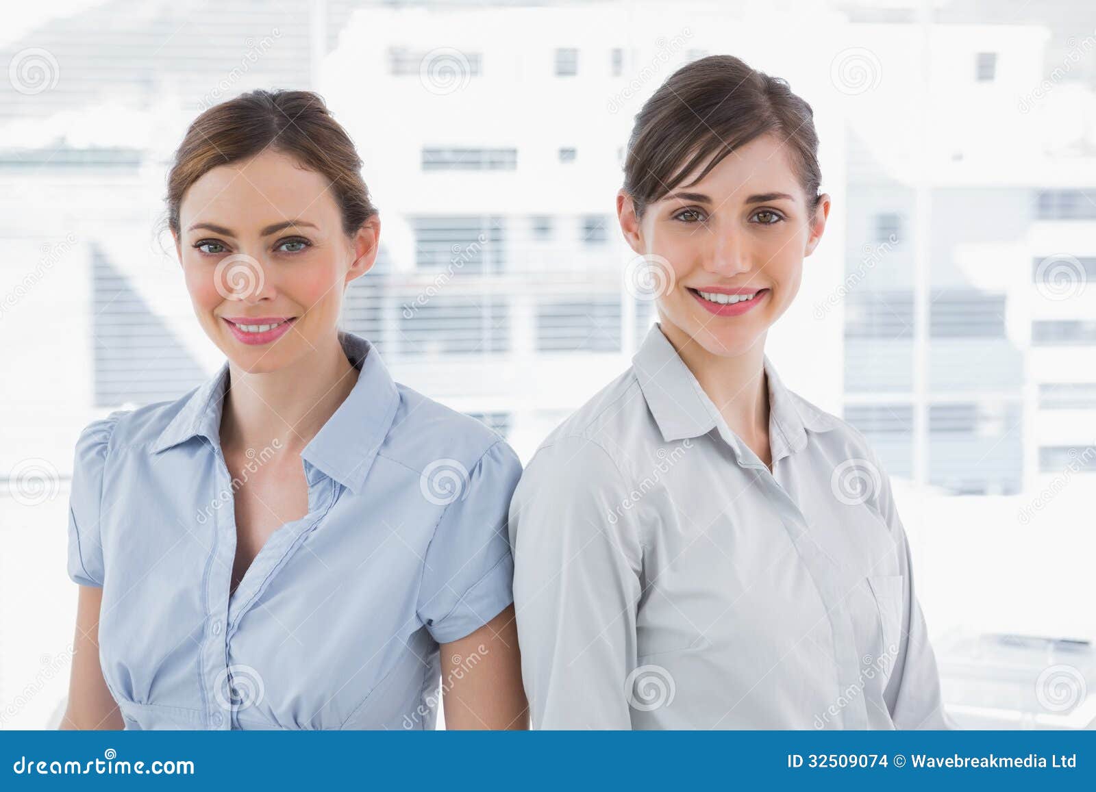 Businesswomen Smiling at Camera Stock Photo - Image of pretty, brunette ...