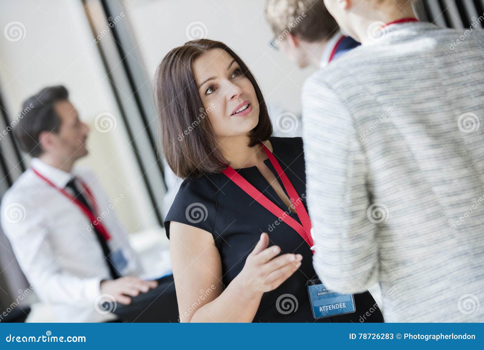 Businesswomen Talking during Coffee Break at Convention Center Stock ...