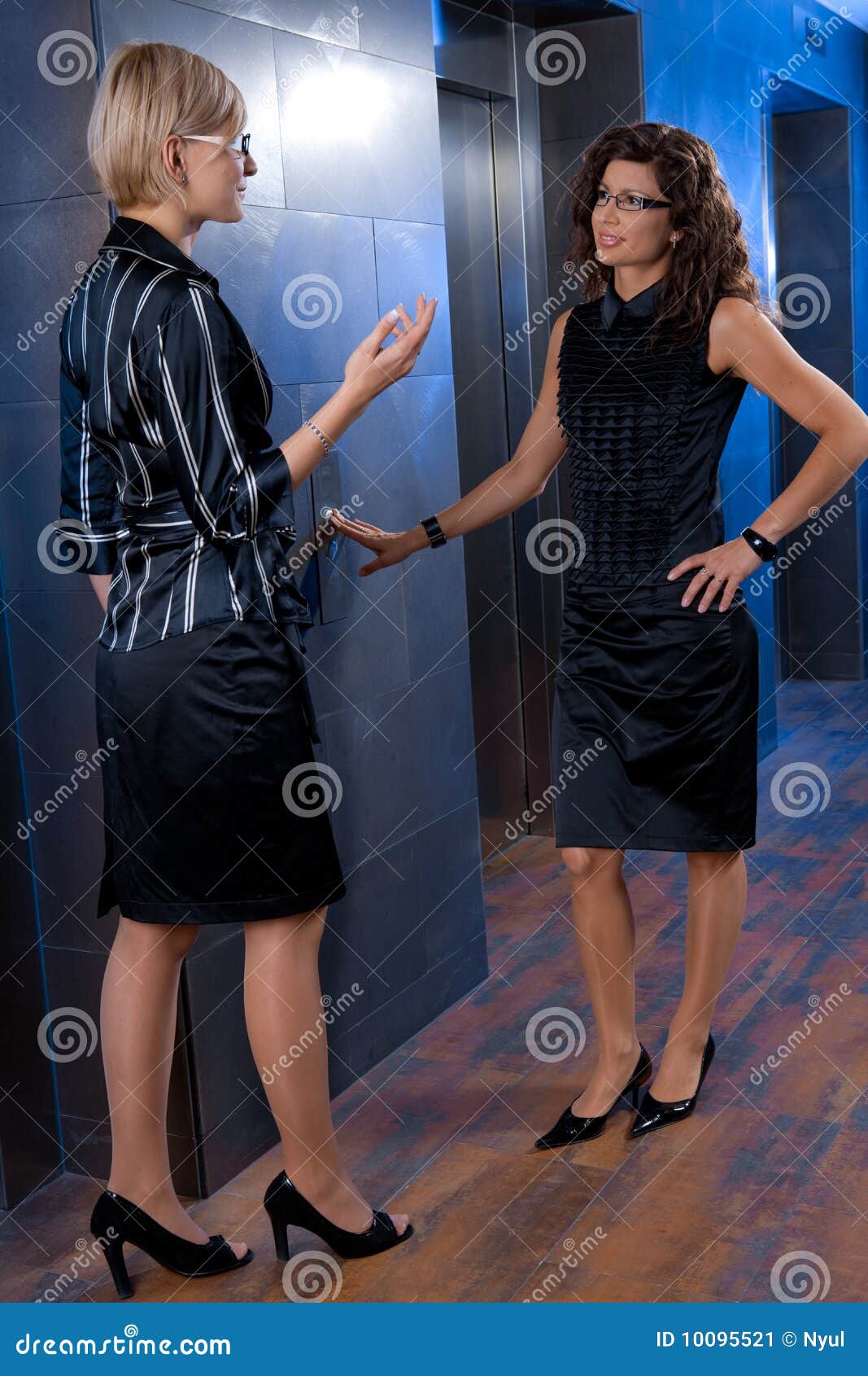 Businesswomen Waiting for Lift Stock Image - Image of closeup, blonde ...