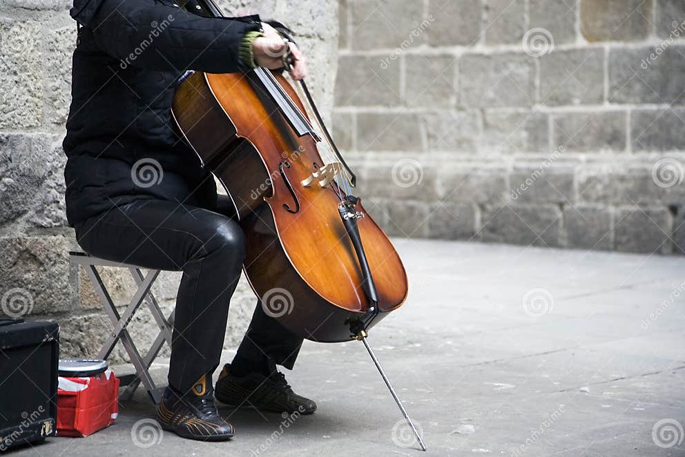 Busker playing the cello stock photo. Image of money - 14111710