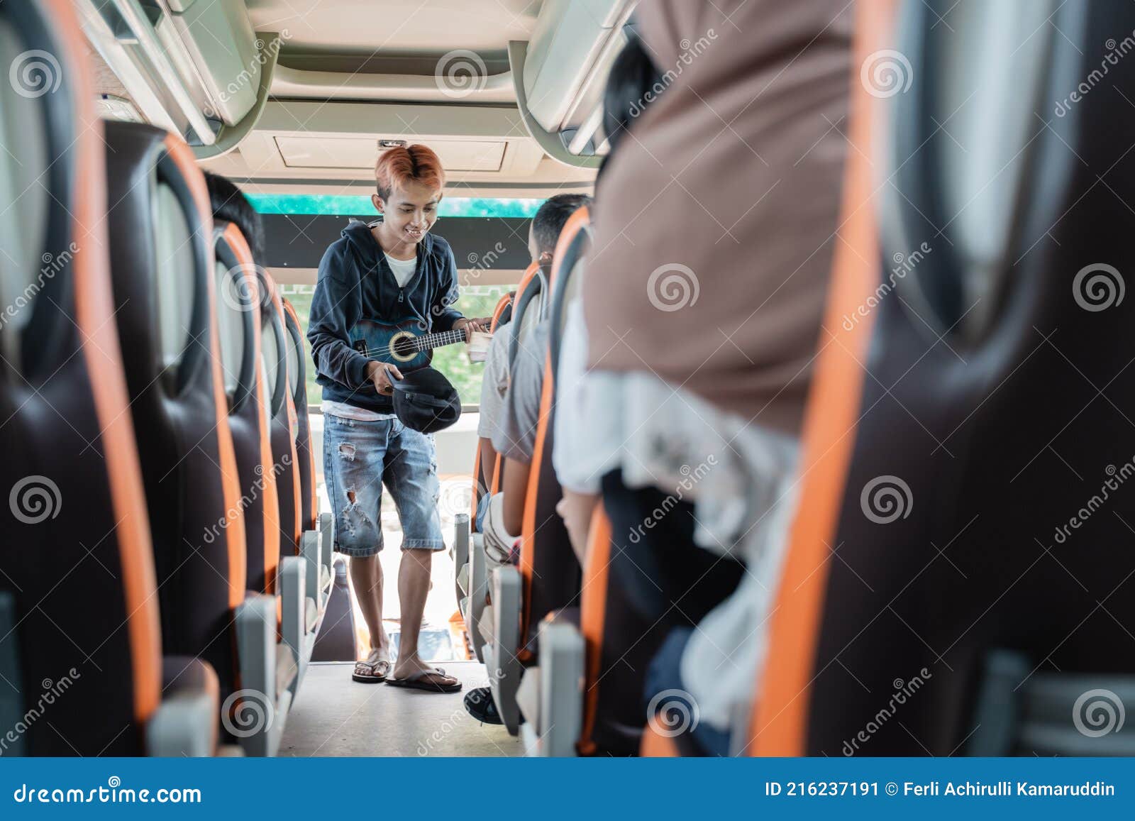 Busker Using Ukulele Musical Instruments and Hats Asking for Money from ...