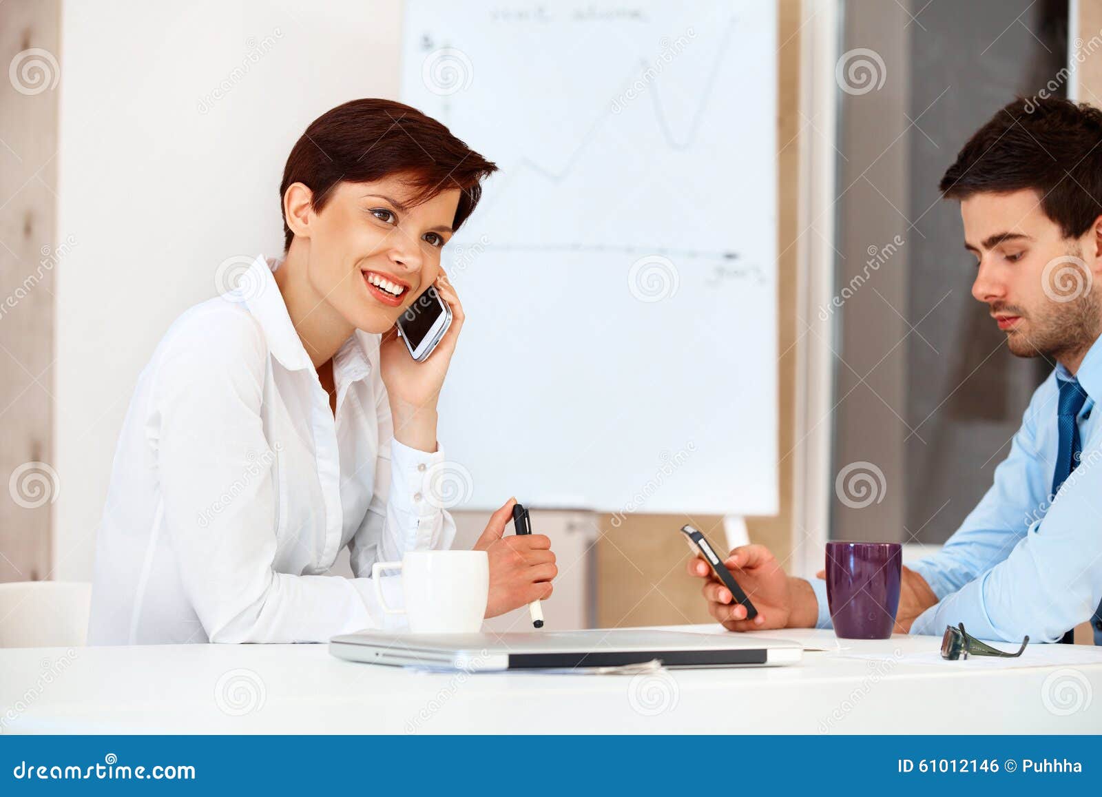 Bussiness People Using Cell Phones in a Office Stock Photo - Image of ...