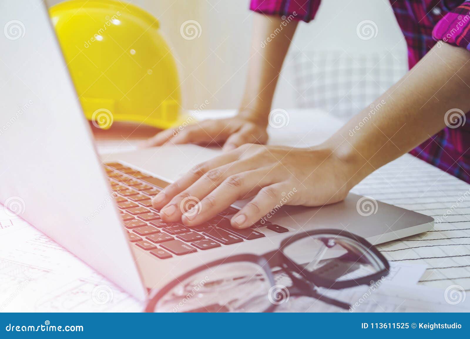 Bussiness Woman of Engineer Looking at a Computer for Construction on ...
