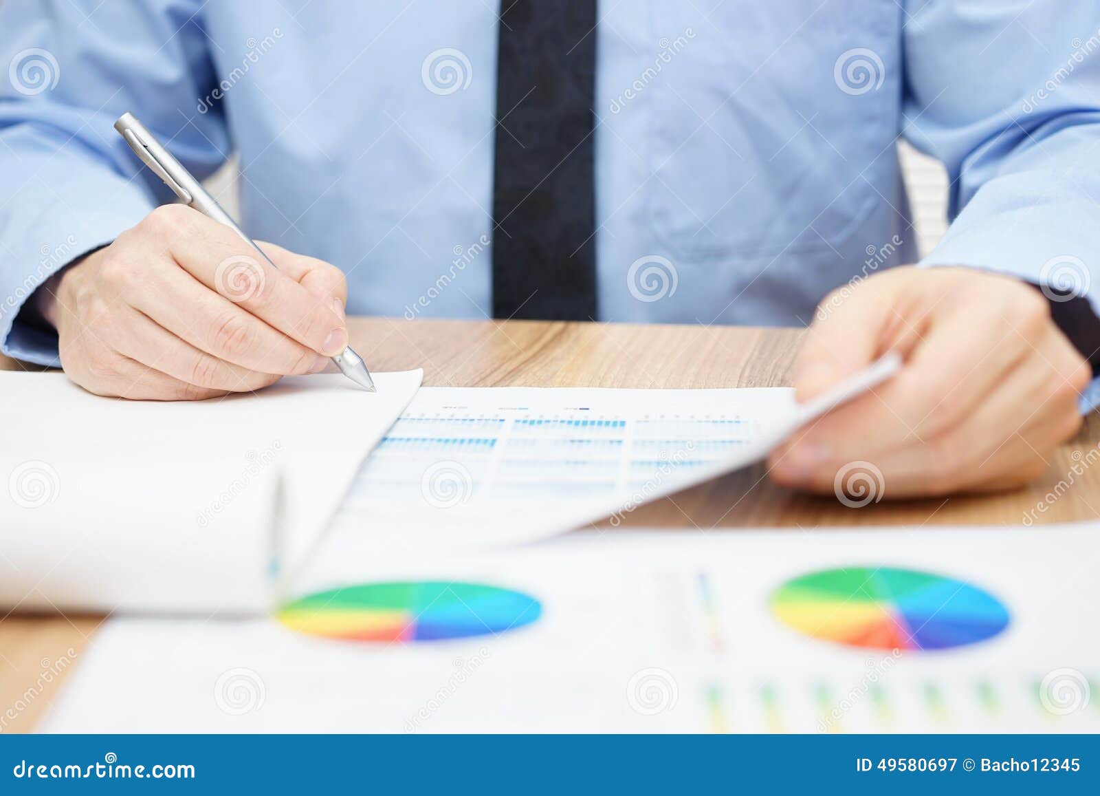 Bussinessman Examines Data and Numbers and Finalizing Report Stock ...