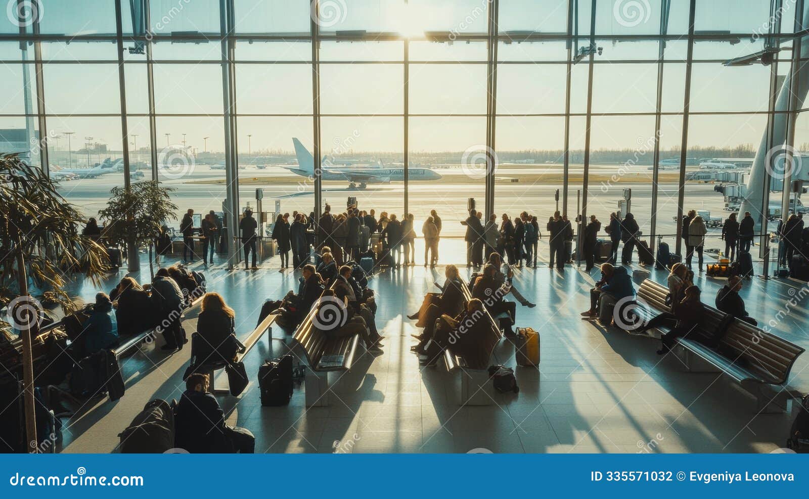 Busy Airport Terminal with Passengers Waiting at Gate, Bright Light and ...