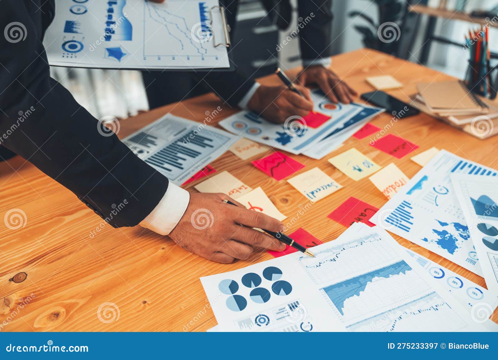 Busy Analyst Team Discuss Financial Data on Dashboard with Post Note ...