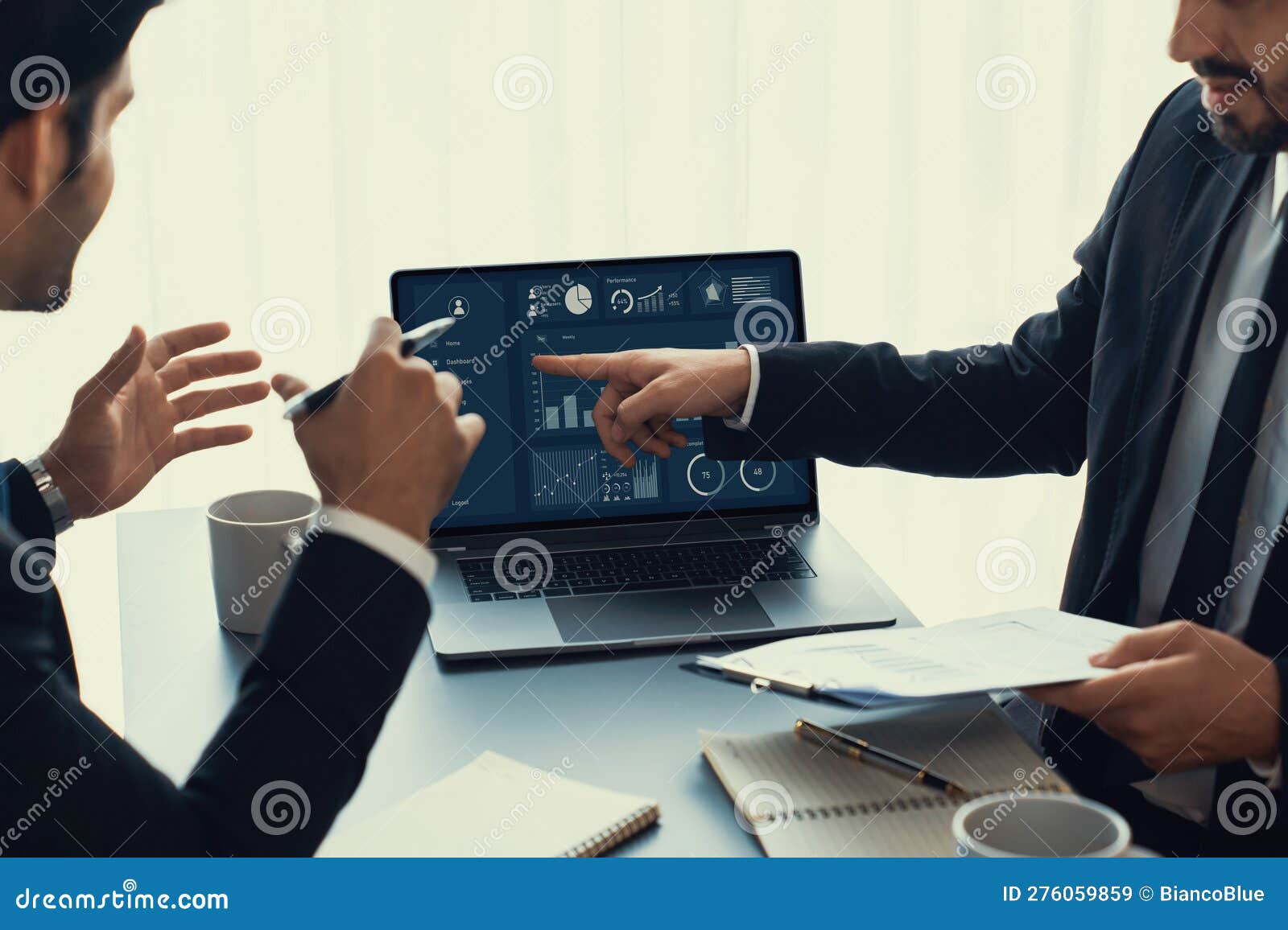 Busy Analyst Team Discussing Financial Data on Laptop. Fervent Stock ...