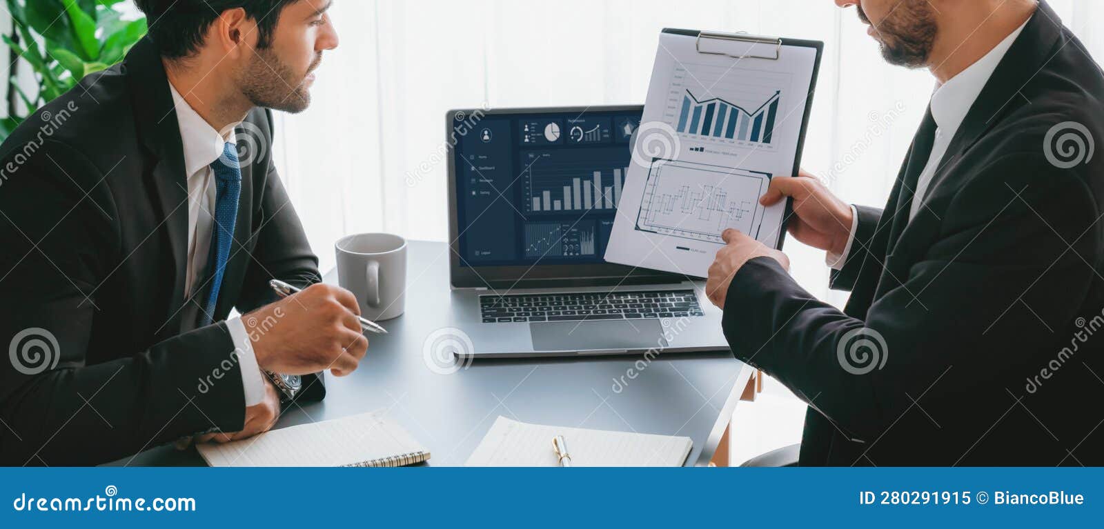 Busy Analyst Team Discussing Financial Data on Laptop. Fervent Stock ...