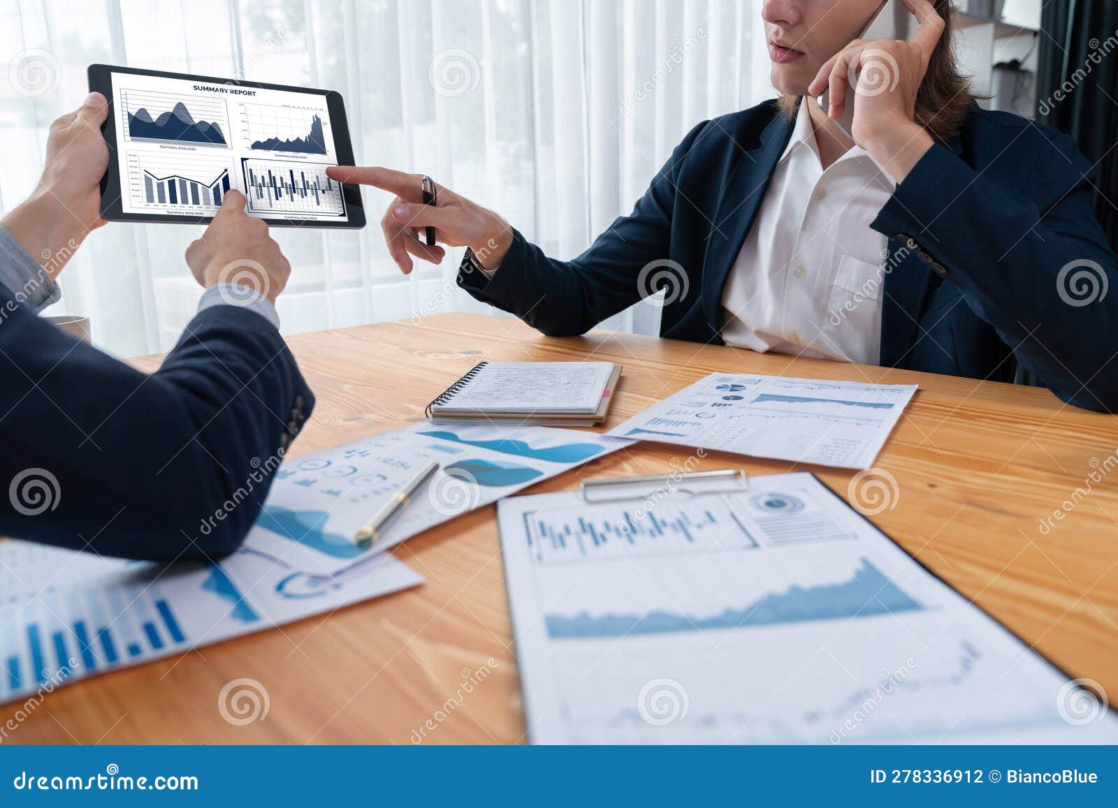 Busy Analyst Team in Office Analyzing Financial Data Analysis by Tablet ...