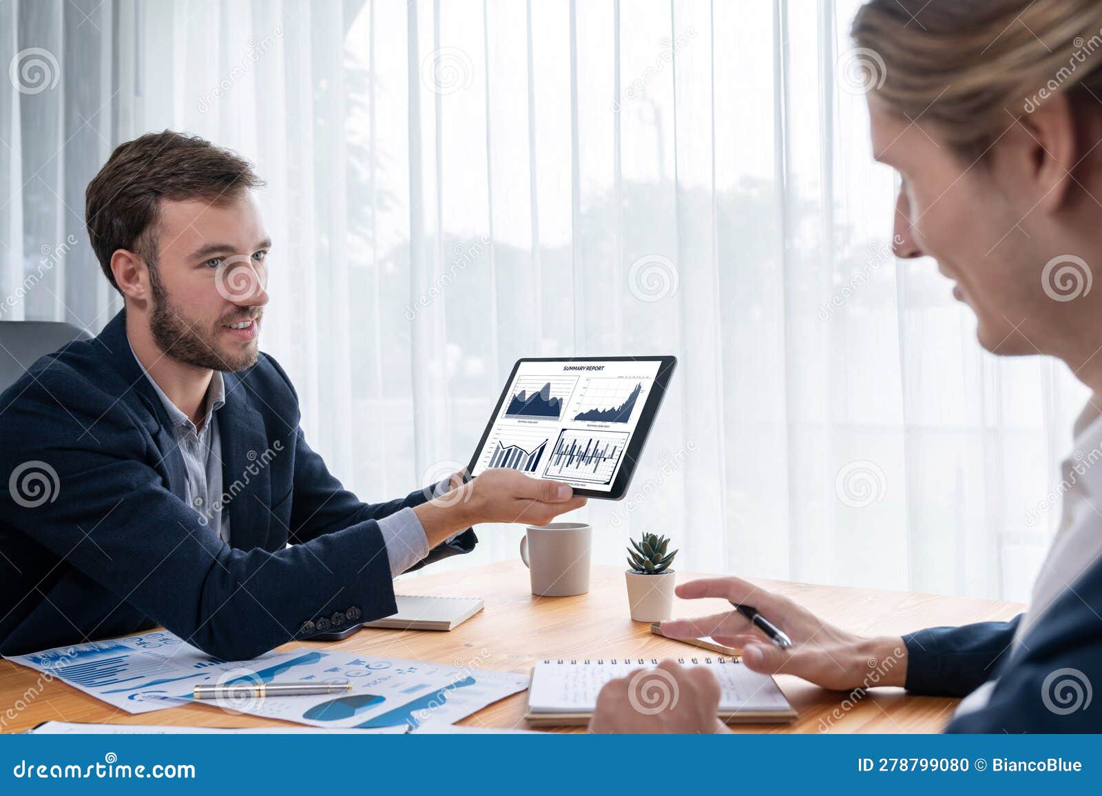 Busy Analyst Team in Office Analyzing Financial Data Analysis by Tablet ...
