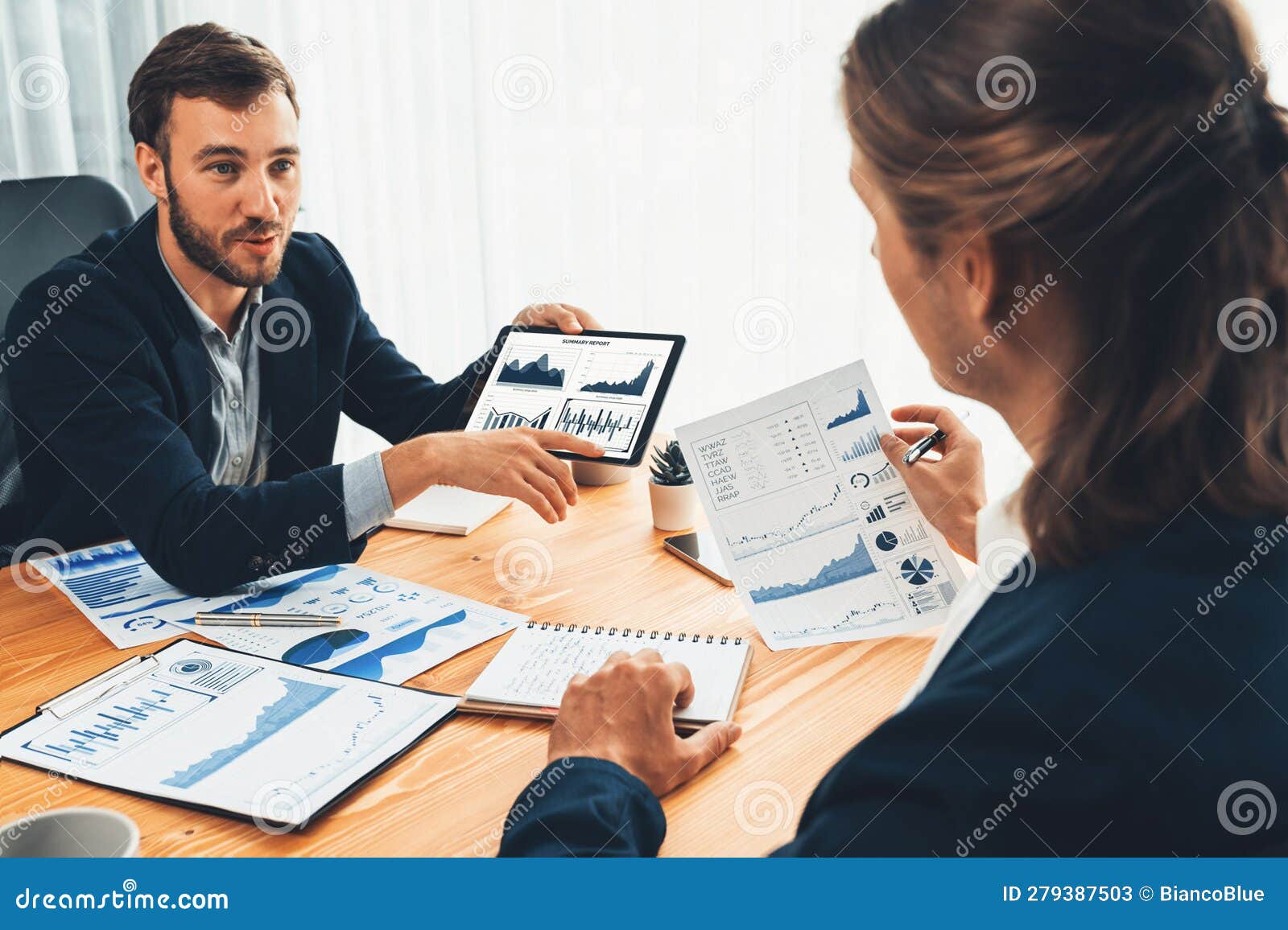 Busy Analyst Team in Office Analyzing Financial Data Analysis by Tablet ...