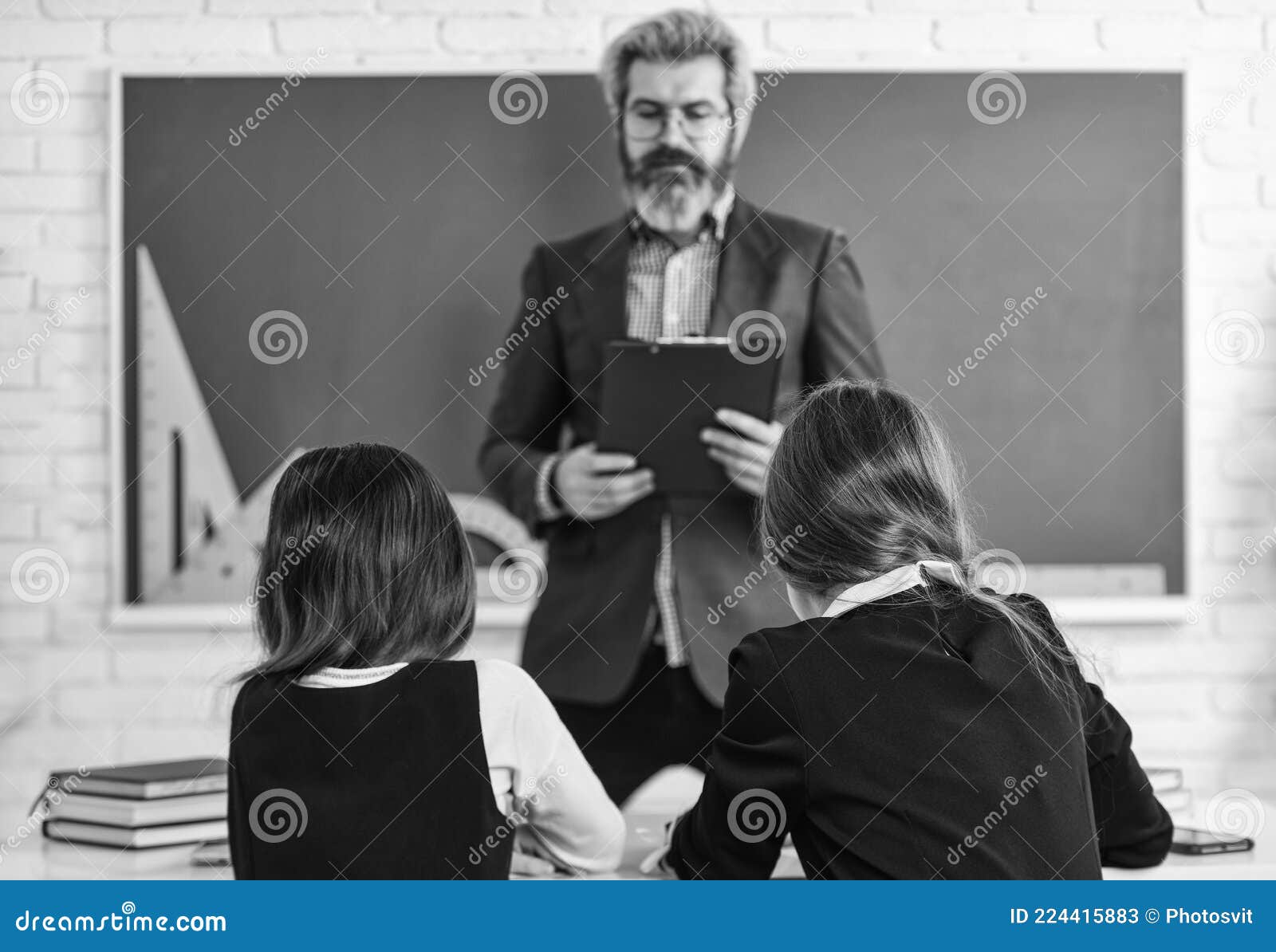 Really Busy. Back To School. Teacher and Pupils Working at Desk ...