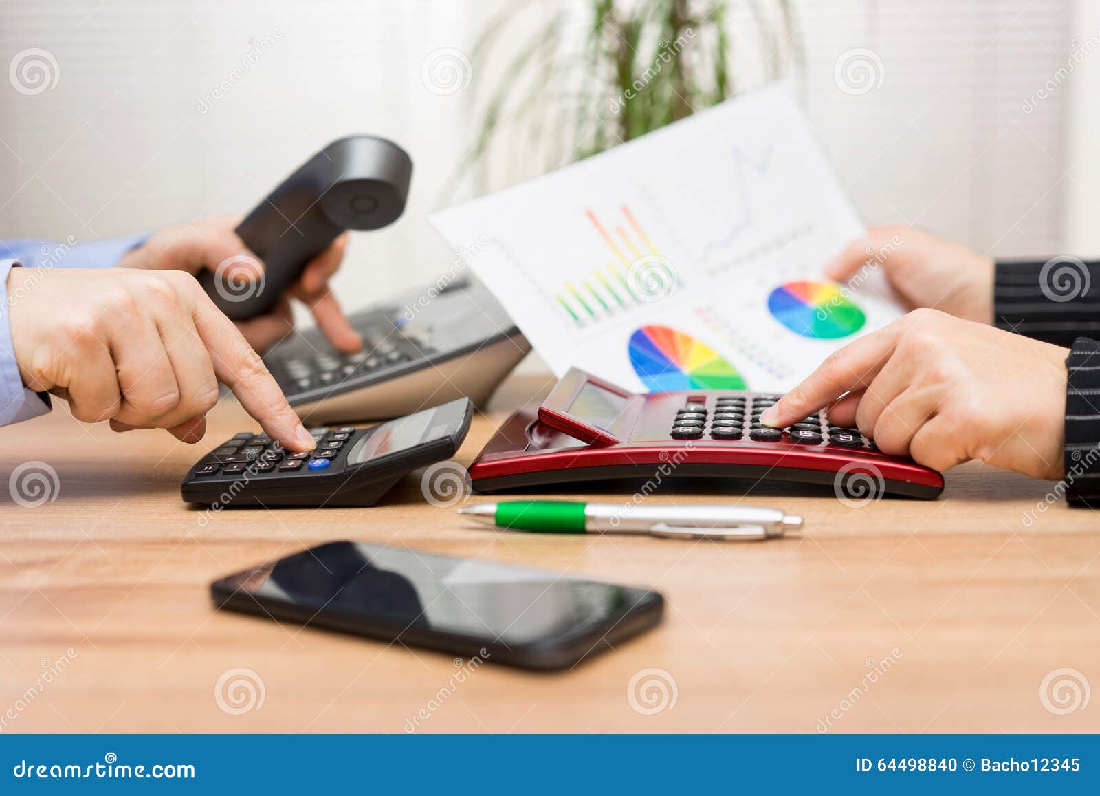 Busy Business Team are Working on Financial Report and Calling C Stock ...