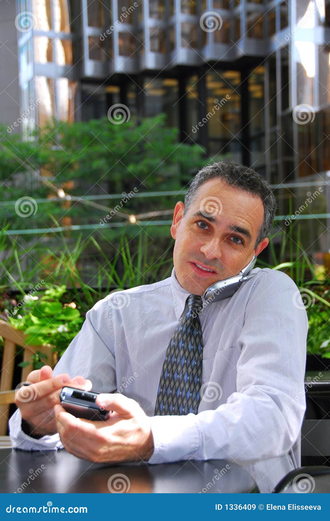 Busy businessman stock image. Image of palm, communication - 1336409